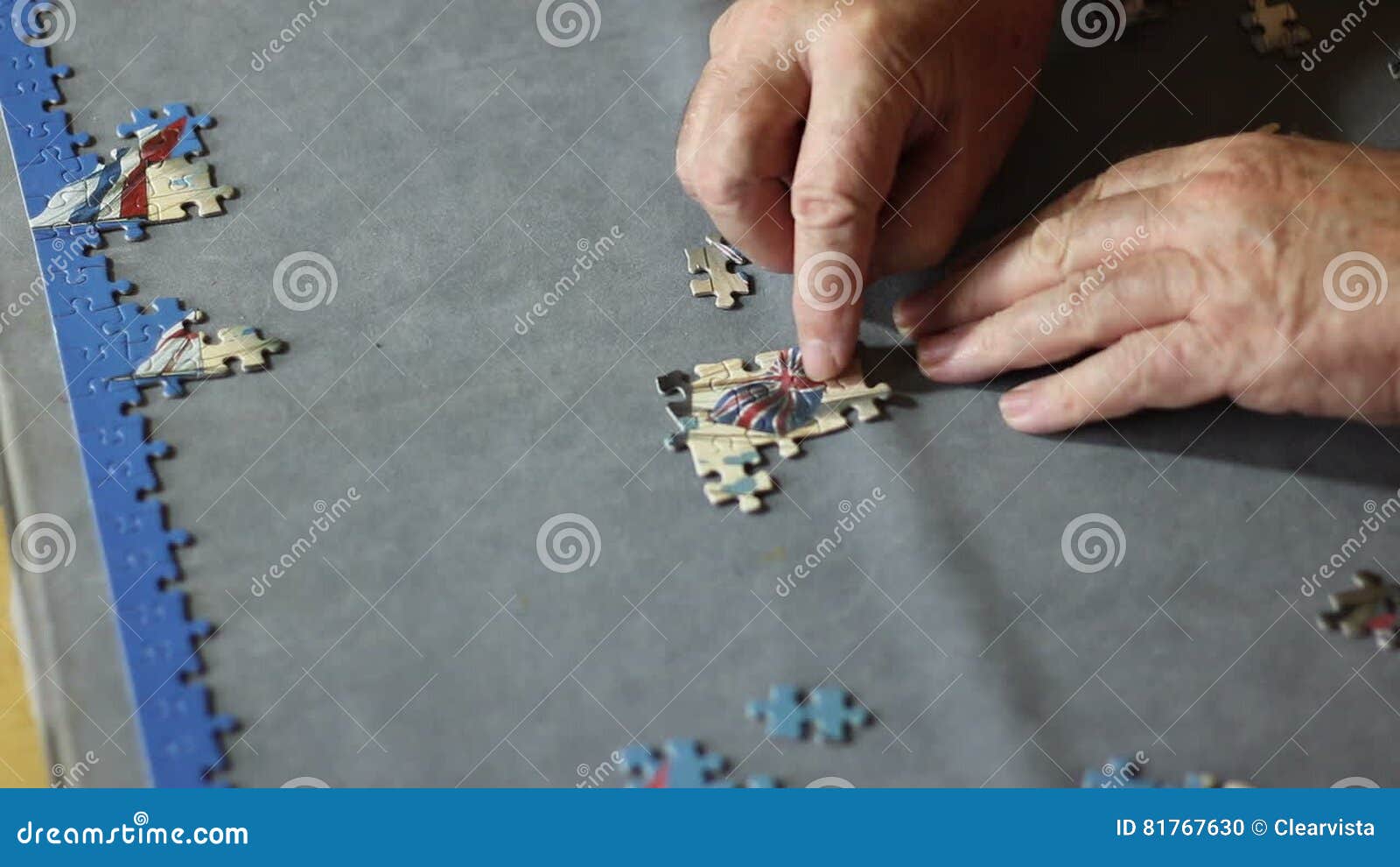 Close Up Hands Fitting Jigsaw Puzzle Pieces. Stock Footage - Video of ...