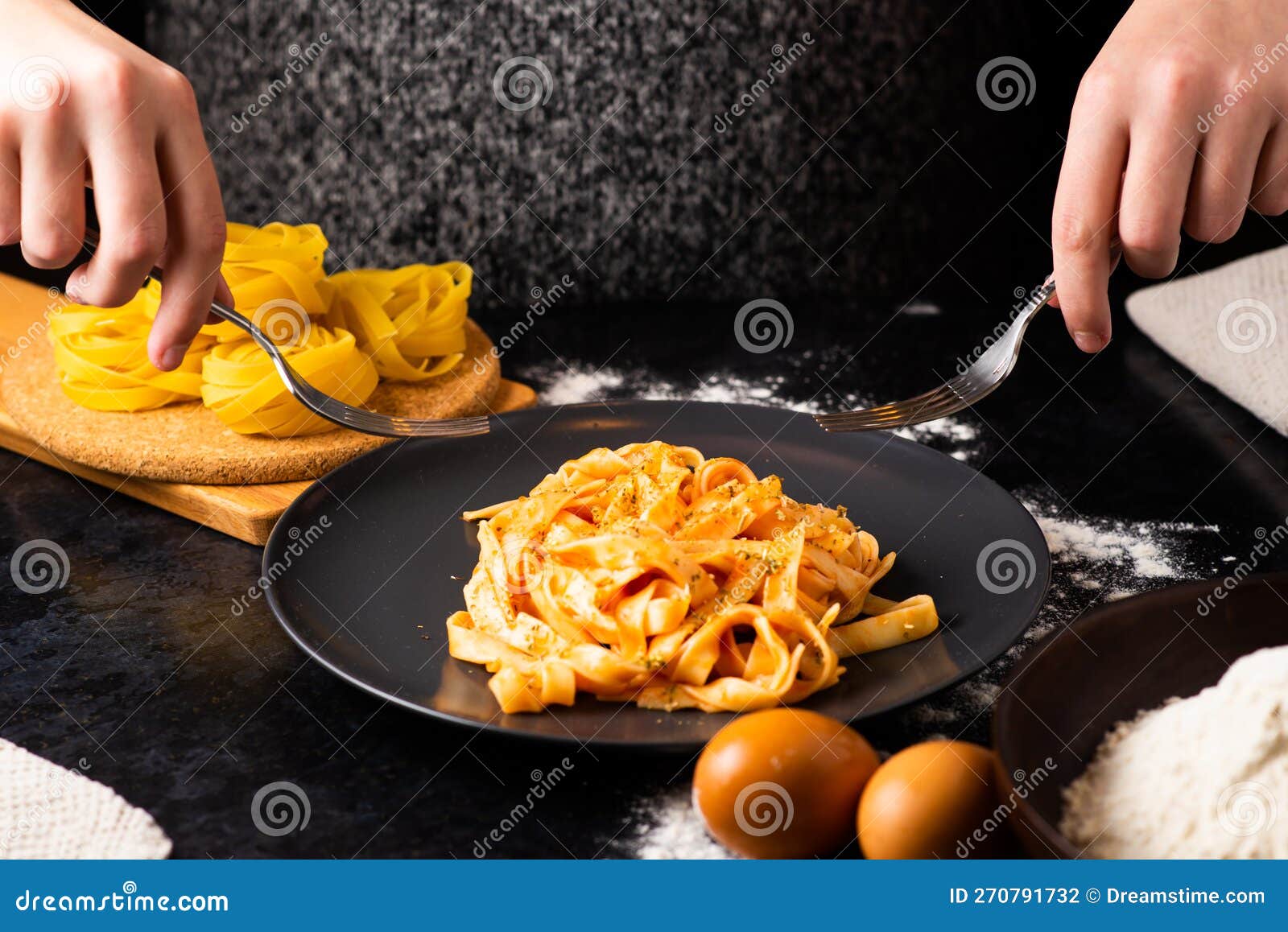 A Close-up of Hands Holding a Fork, Digging into a Plate of Fast Food ...
