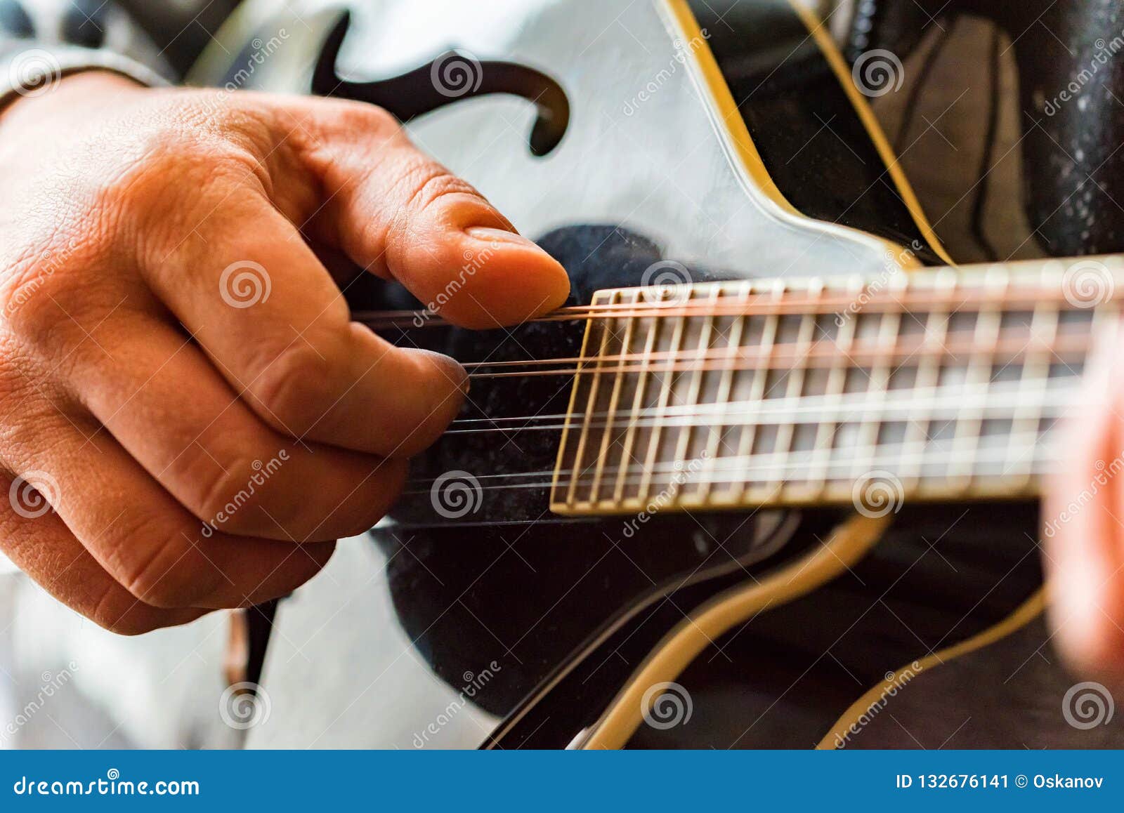 Close Up Hands of Man Playing 8-string Mandolin Stock Image - Image of ...