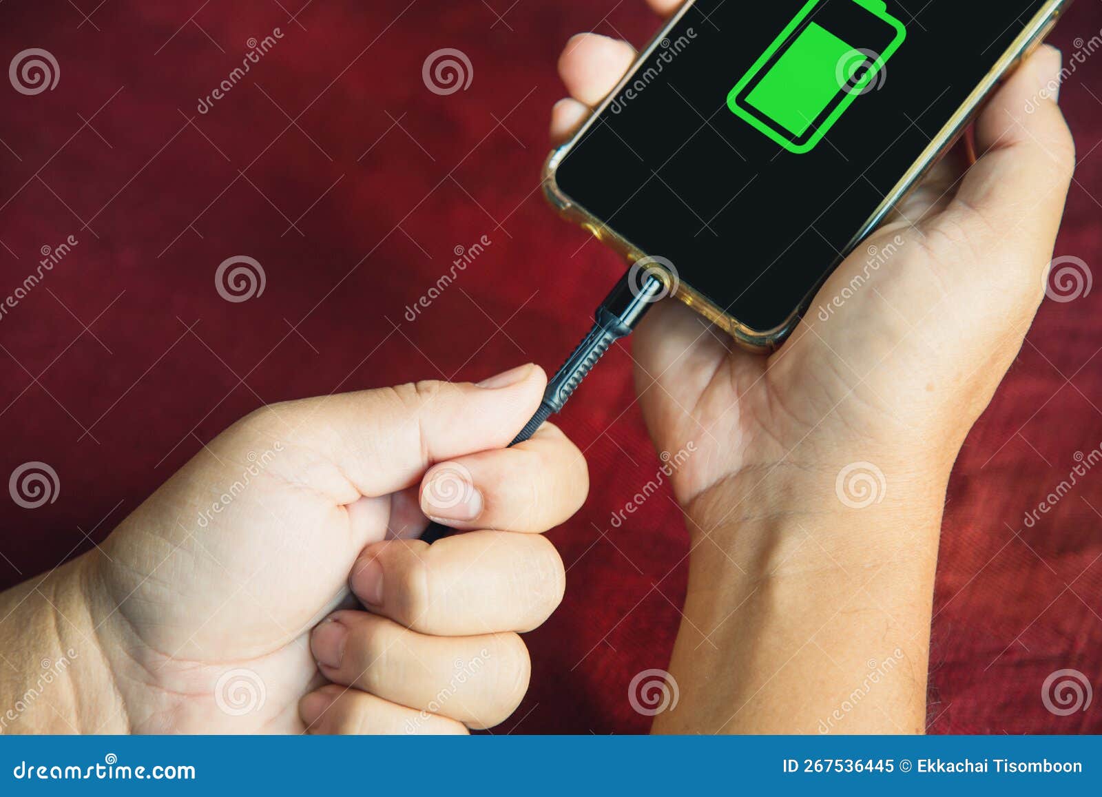 Close Up a Hands Man Pull the Charging Cable Wrongly from Smart Phone ...