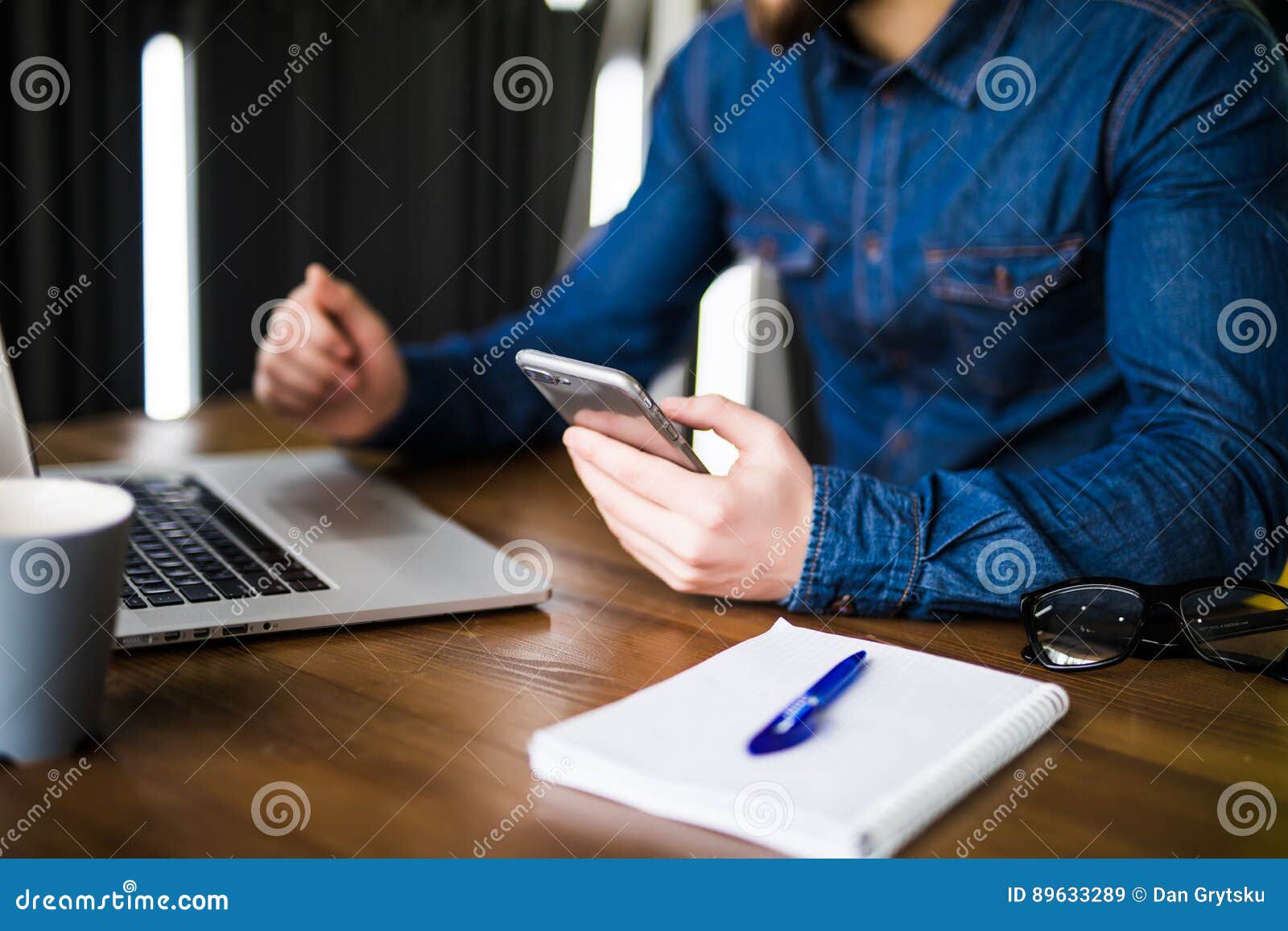 Close Up Hands Multitasking Man Using Laptop and Cellphone Connecting ...