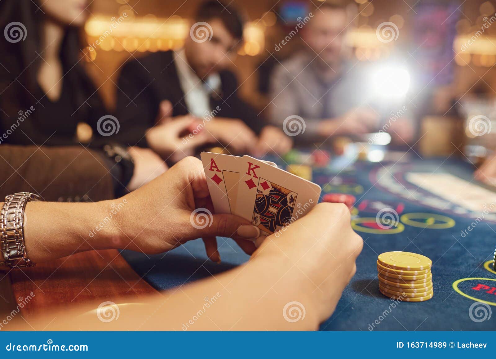 Close-up Hands of a Poker Player Checking Cards in a Casino. Stock ... Close-up Hands of a Poker Player Checking Cards in a Casino. Stock ...