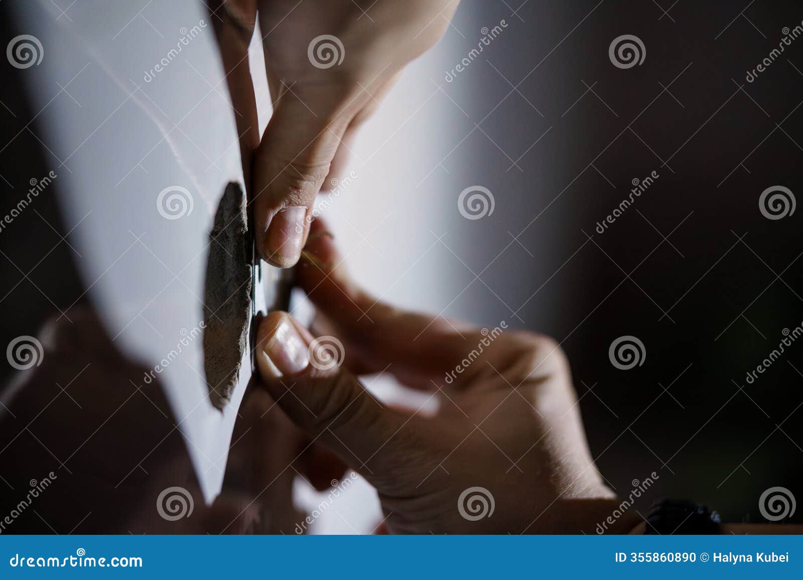 Close-up of Hands Removing a Sticker from a Surface Stock Photo - Image ...