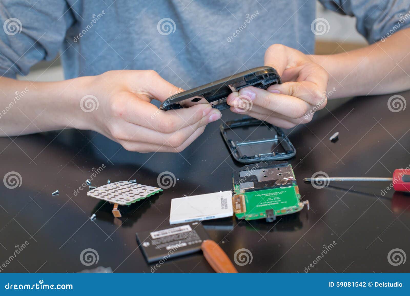Close Up of Hands Repairing a Mobile Phone Stock Photo - Image of ...