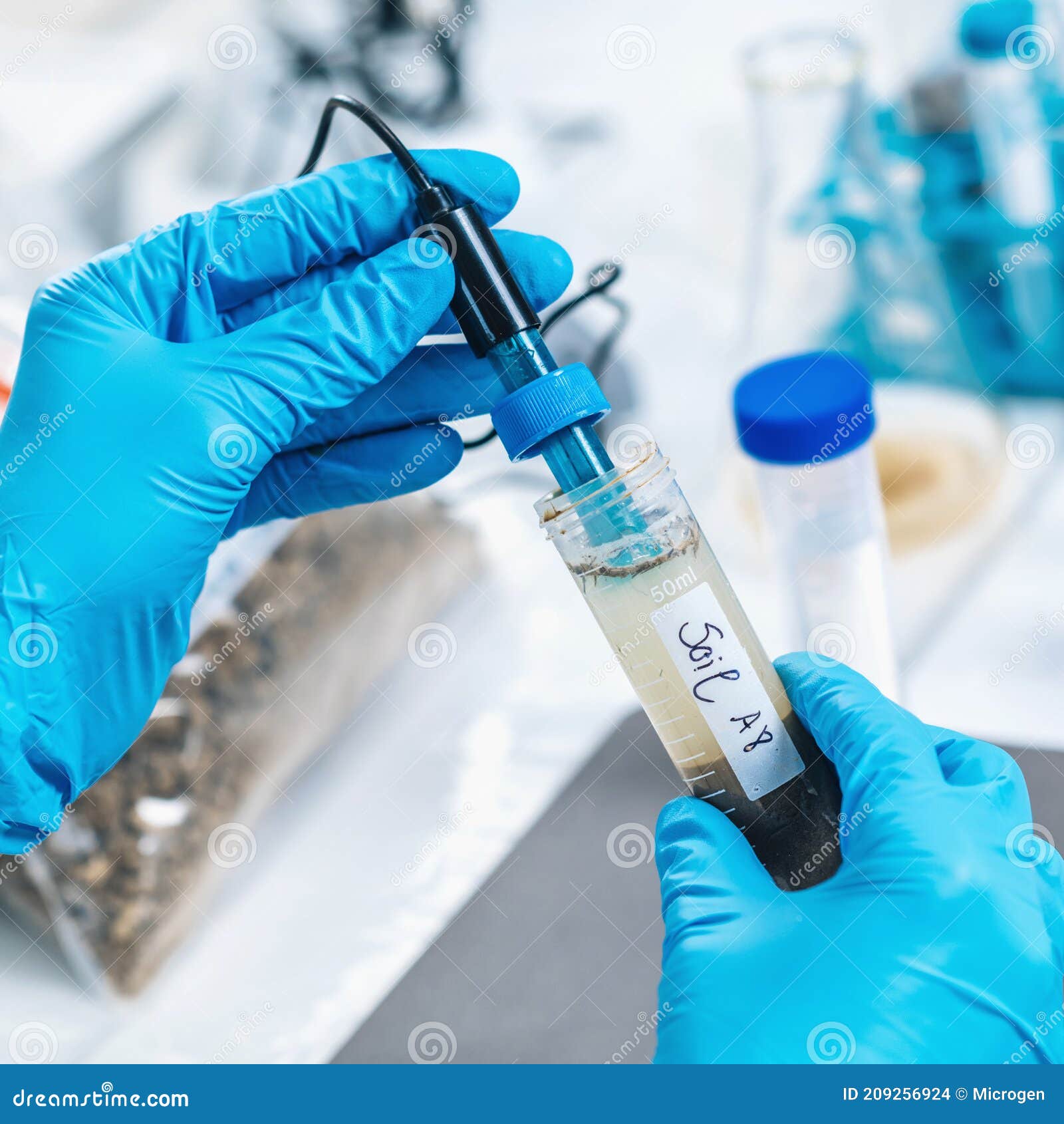 Soil Laboratory Analysis. Scientist Measuring PH of Soil Sample Stock ...