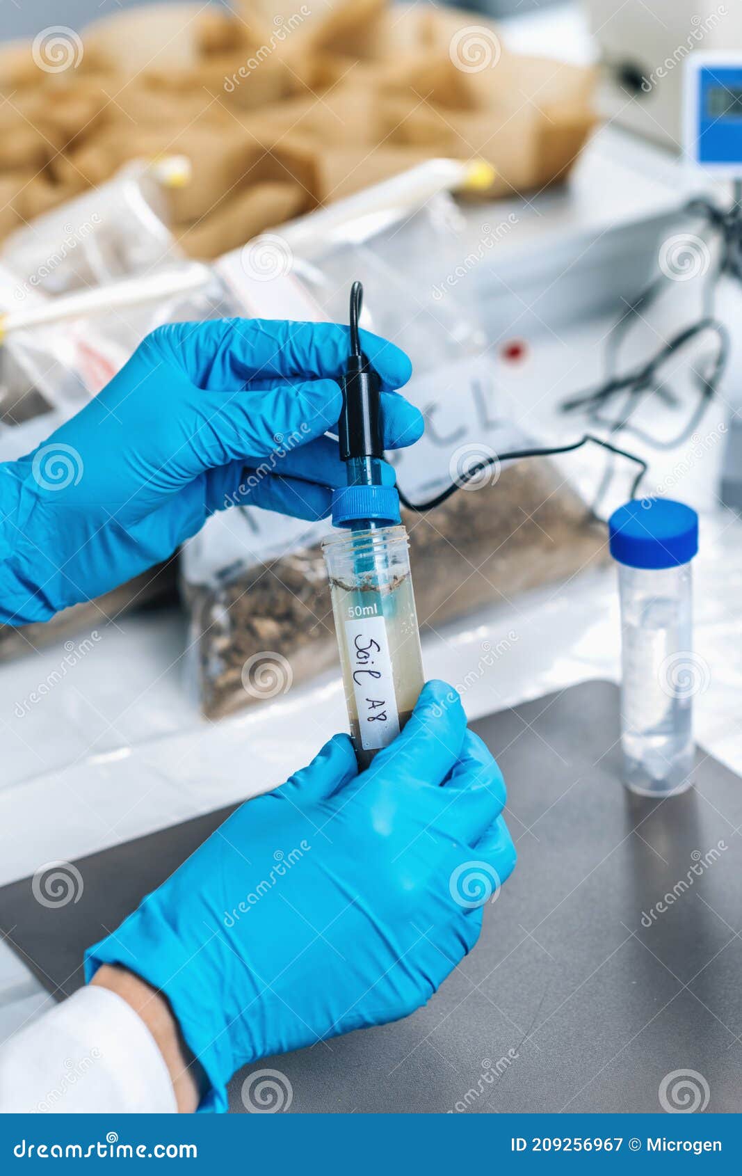 Soil Laboratory Analysis. Scientist Measuring PH of Soil Sample Stock ...