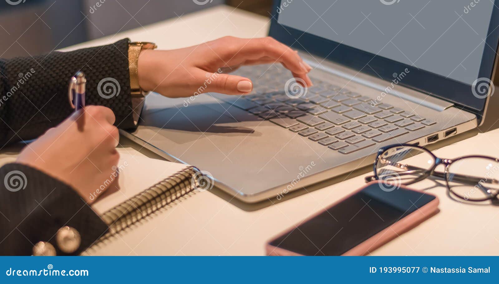 Close Up of a Hands Scrolling on a Laptop and Something Written on ...