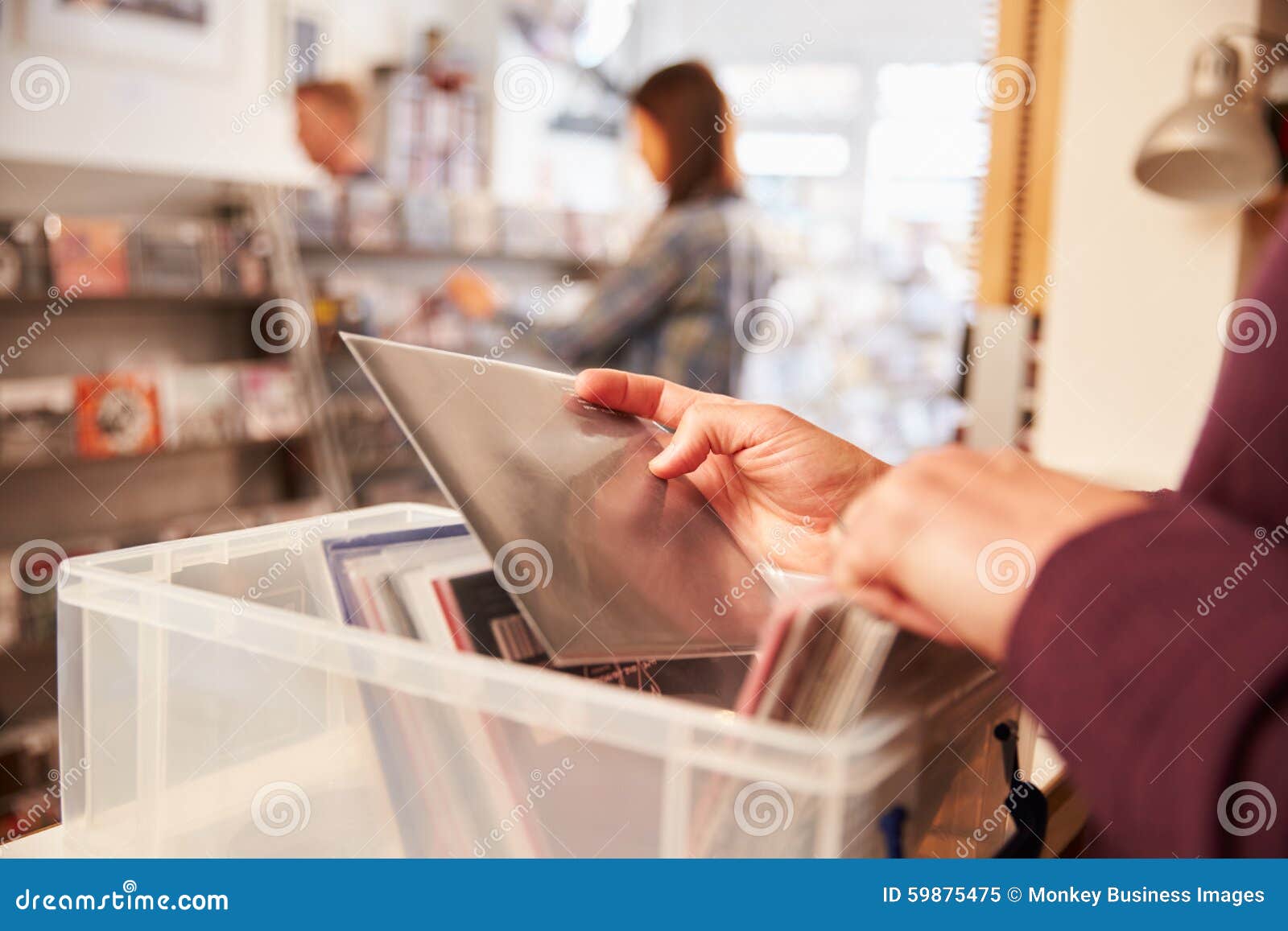 Close-up of Hands Sorting through Records at a Record Shop Stock Image ...