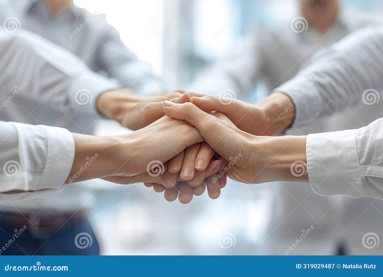 Close-up of Hands Stacked Together in a Gesture of Unity and Teamwork ...