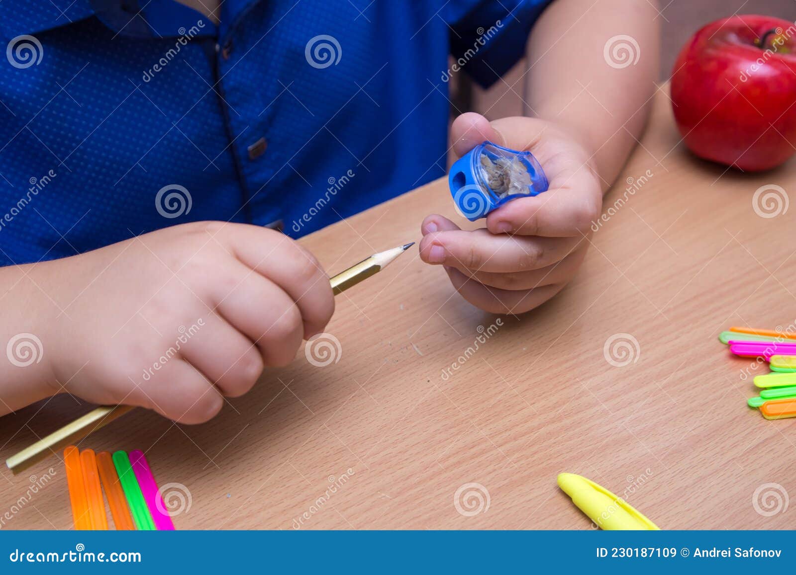 Close-up Hands of a Student with a Finger Check How Sharpened the ...