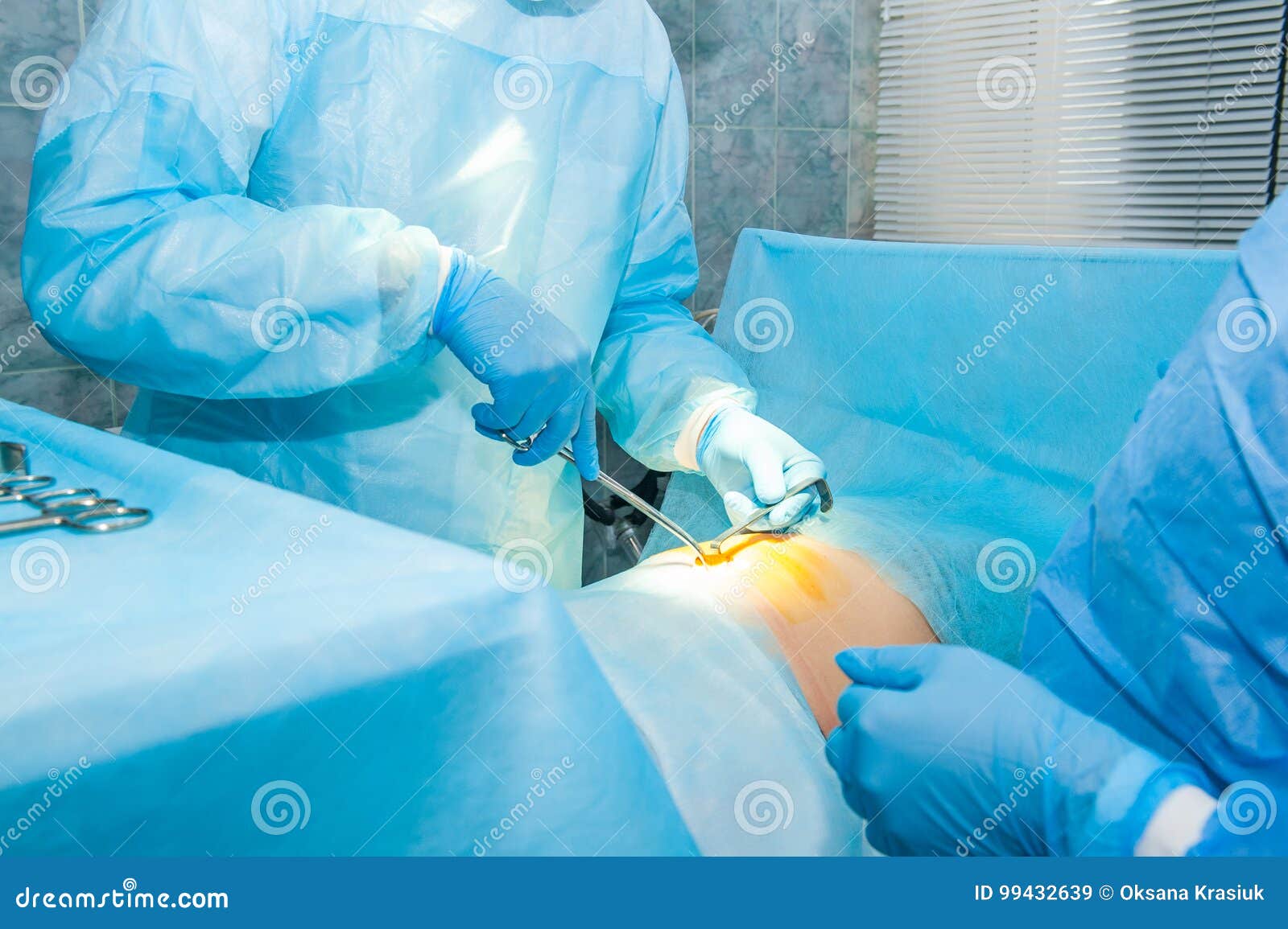 Close Up Hands of a Surgeon and an Assistant with Instruments during ...
