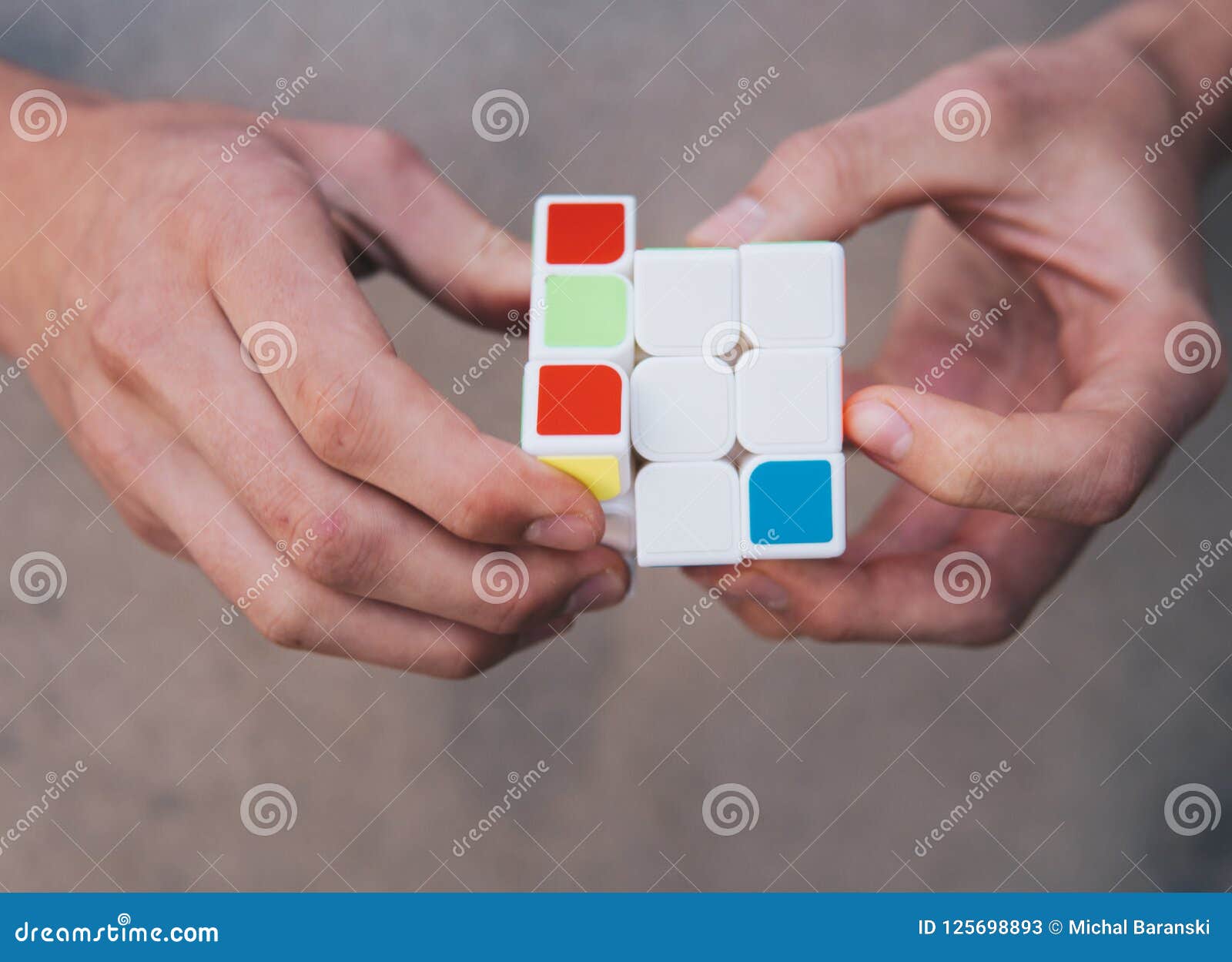 Hands Holding Rubik Cube Editorial Photo | CartoonDealer.com #125698893