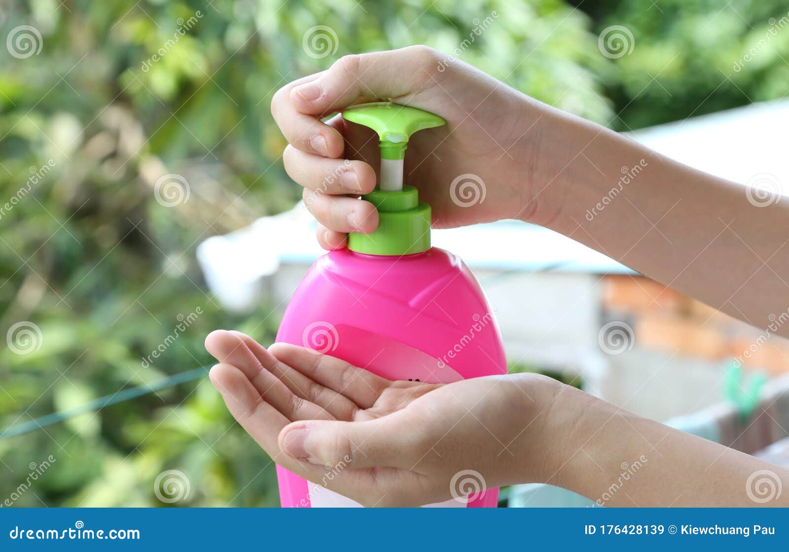 Close Up of Hands Trying To Squeeze Out the Soap Stock Image - Image of ...