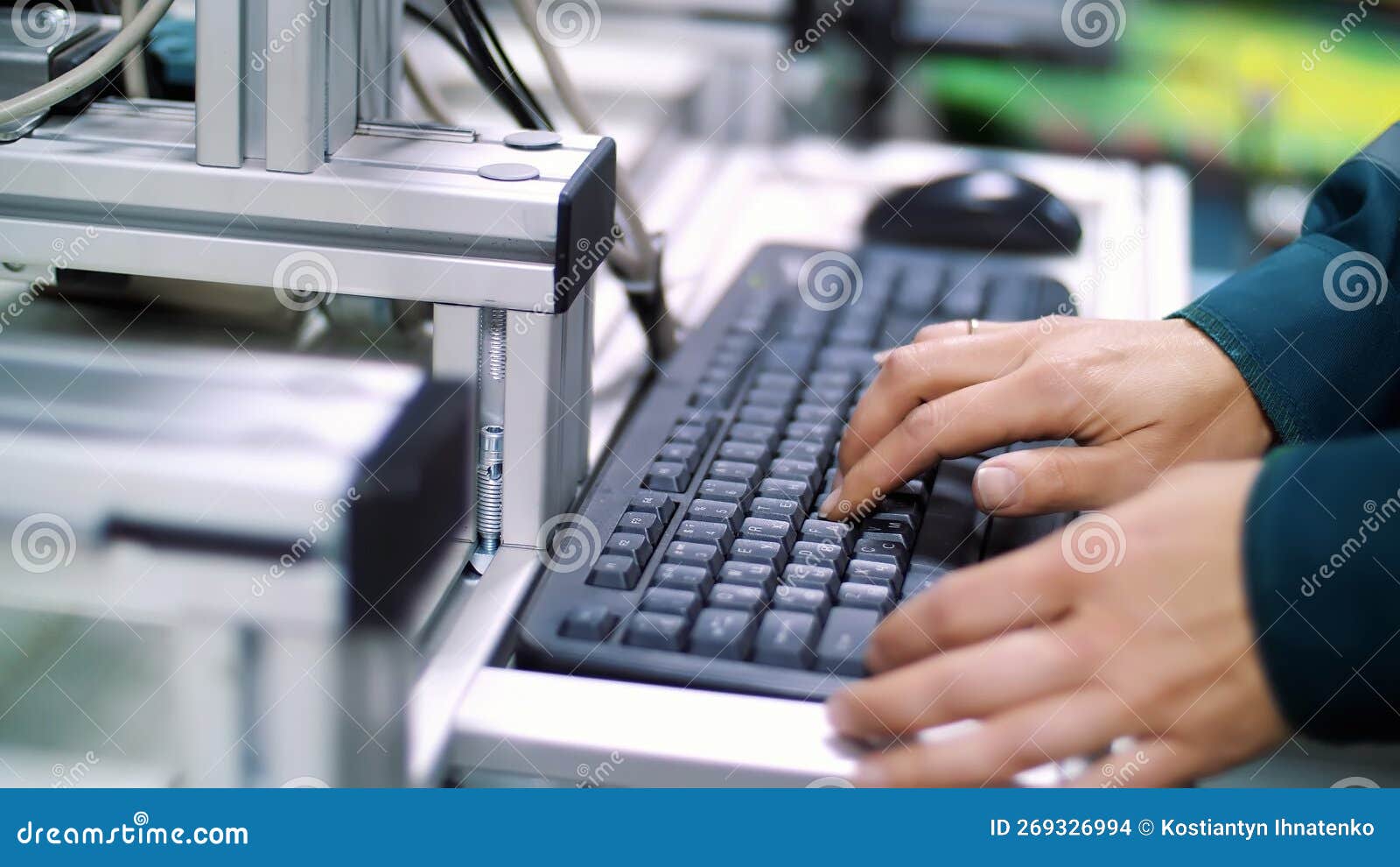 A Close-up, Hands Work on the Keyboard. a Worker at an Enterprise, a ...