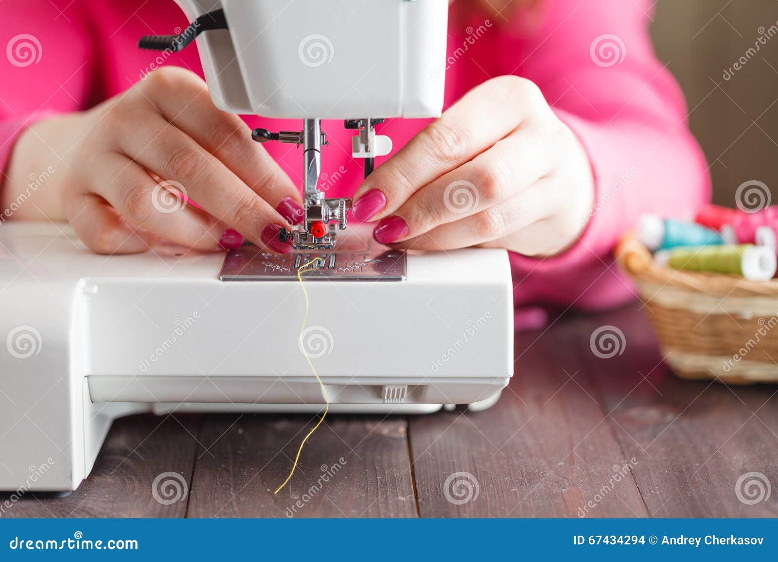 Close-up of Hands Working on a Sewing Machine Stock Photo - Image of ...