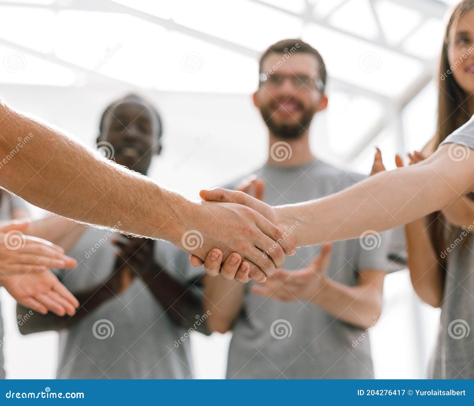 Close Up. Handshake of Two Students on the Background of the St Stock ...