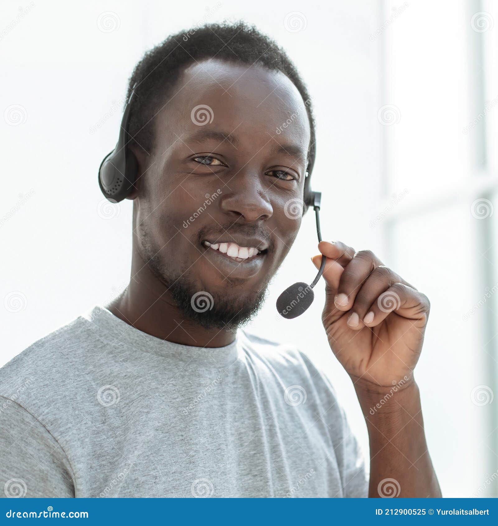 Close Up. a Handsome Young Man with a Headset Stock Image - Image of ...
