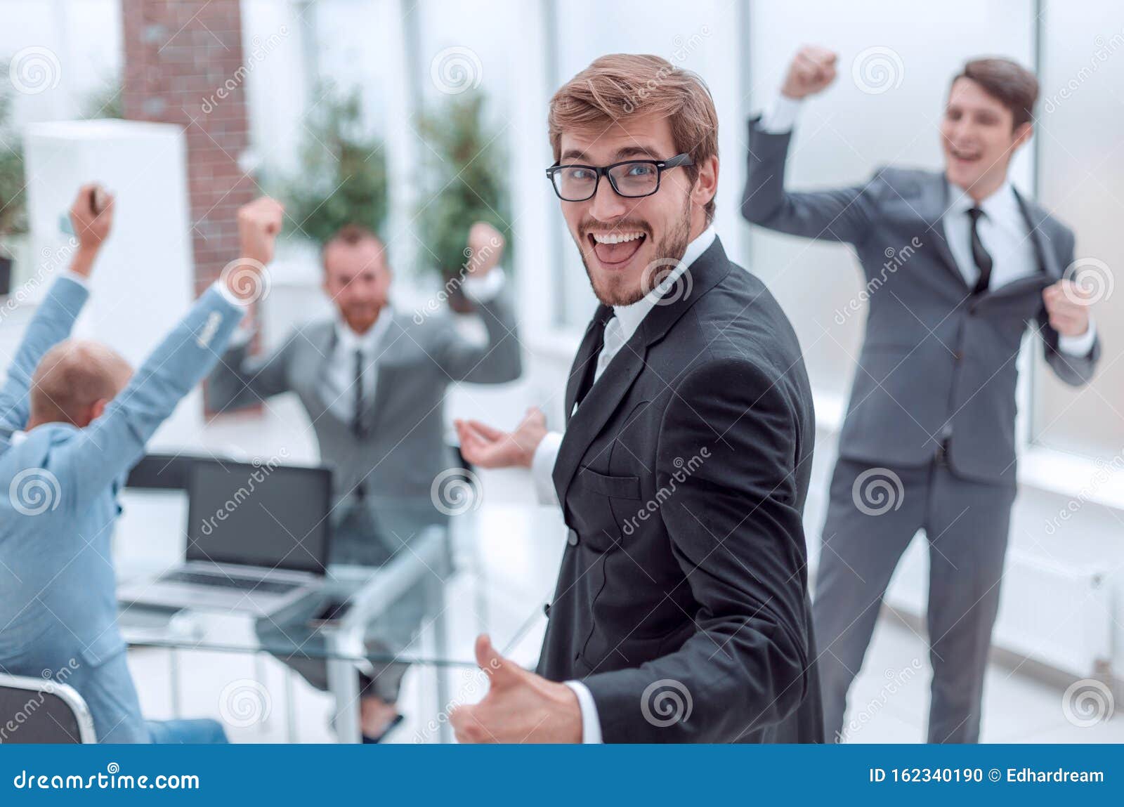 Close Up. Happy Boss Standing in the Office Stock Photo - Image of ...