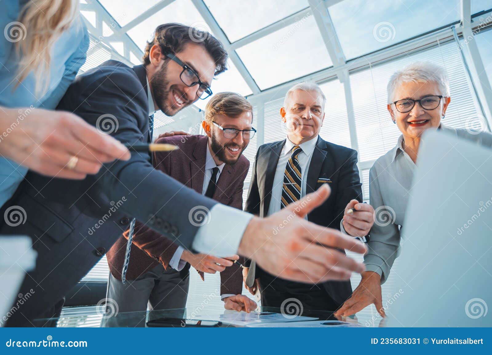 Close Up. Happy Employees Looking at the Laptop Screen Stock Image ...