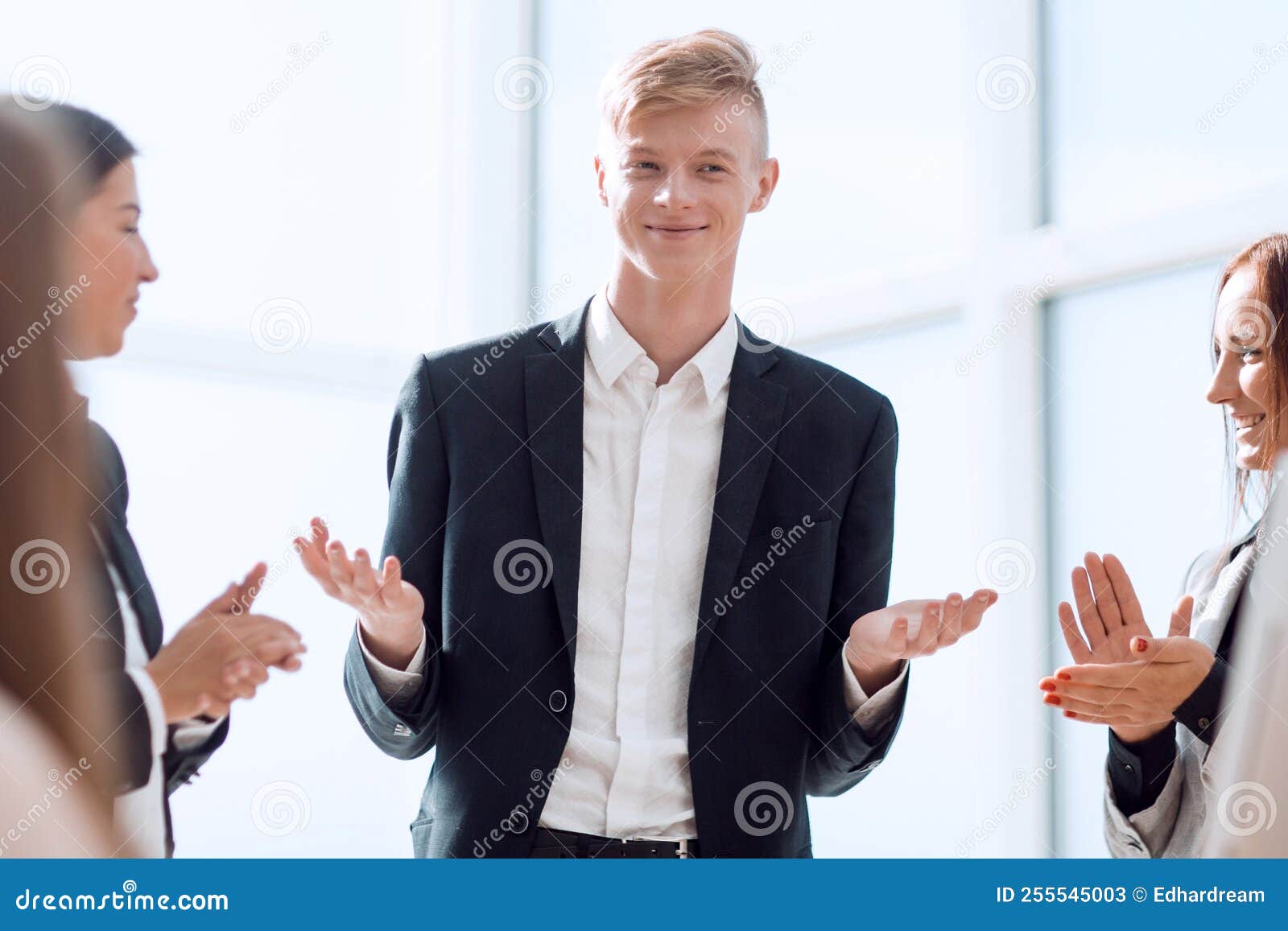 Happy Leader Standing in Front of His Business Team Stock Image - Image ...