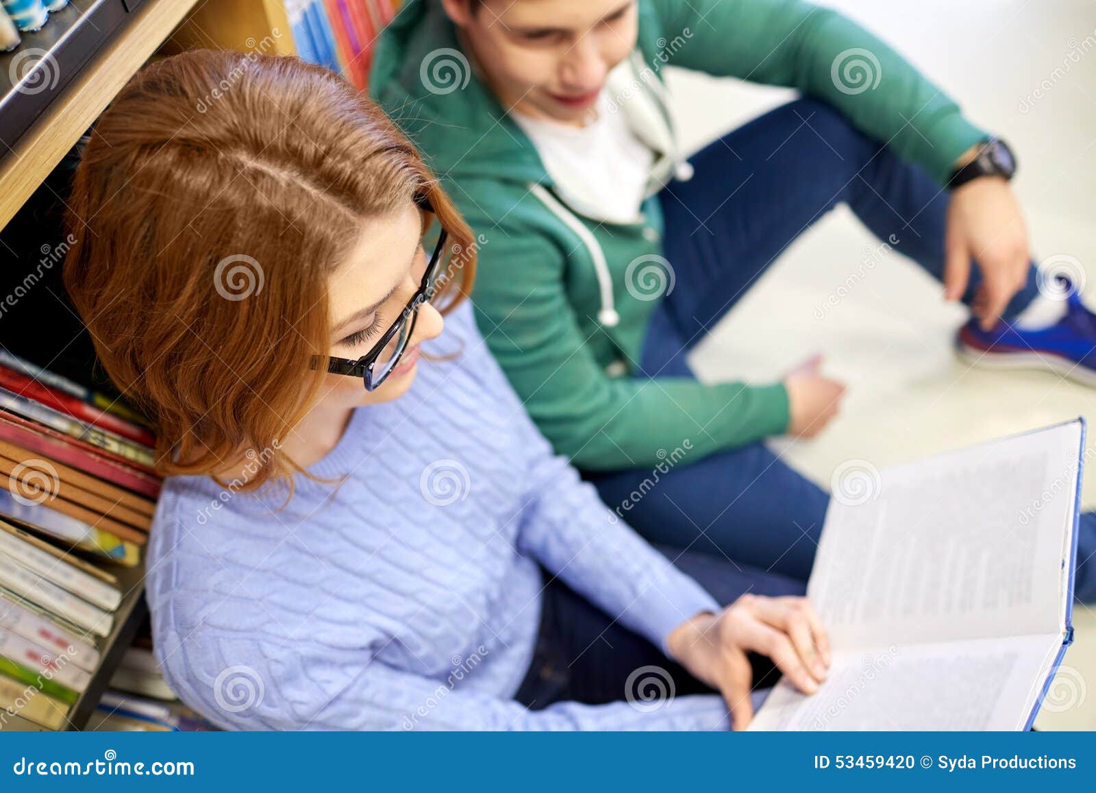 Close Up of Happy Students Reading Book in Library Stock Photo - Image ...