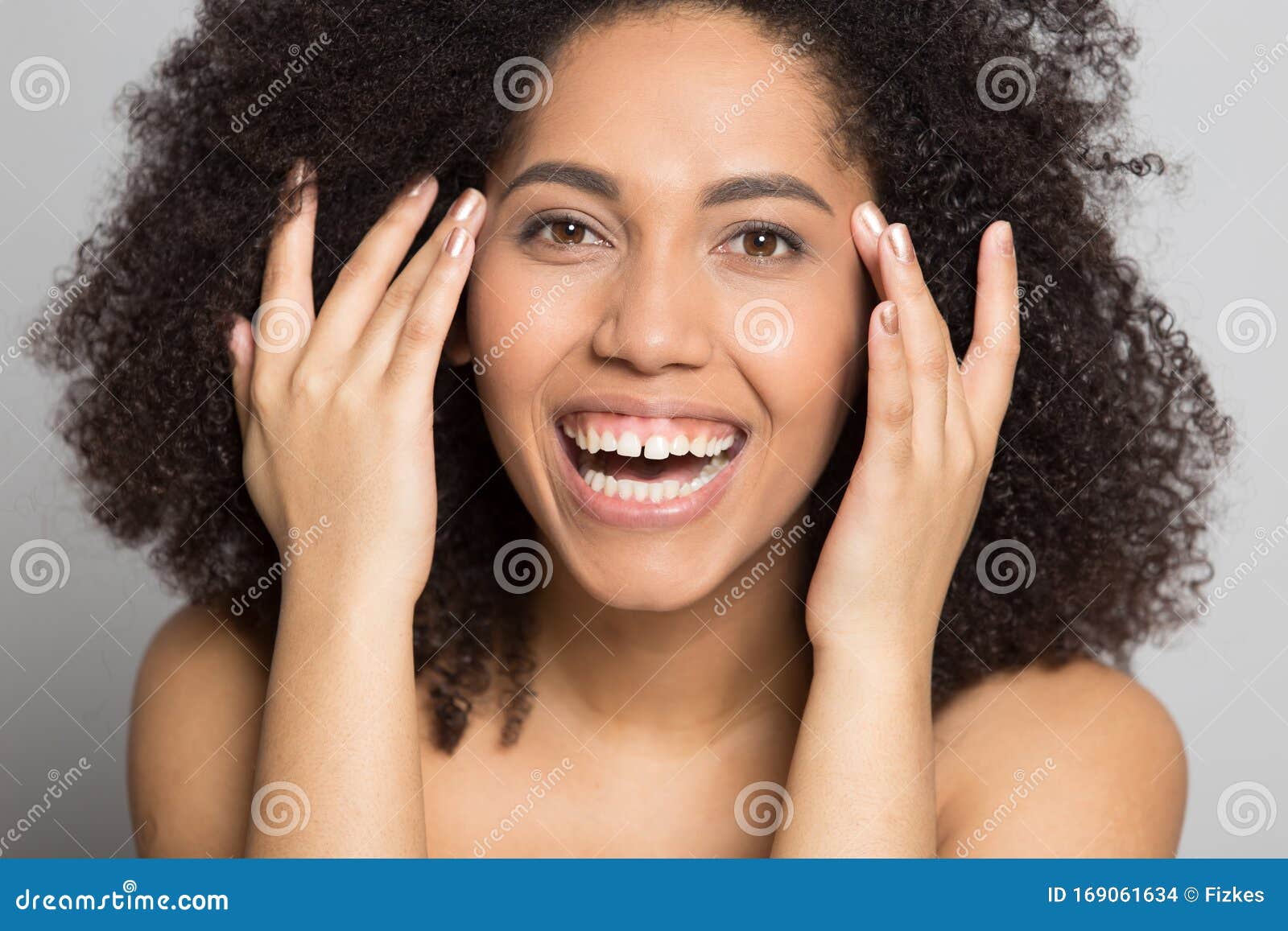 Overjoyed African American Young Woman Satisfied With Mimic Wrinkles