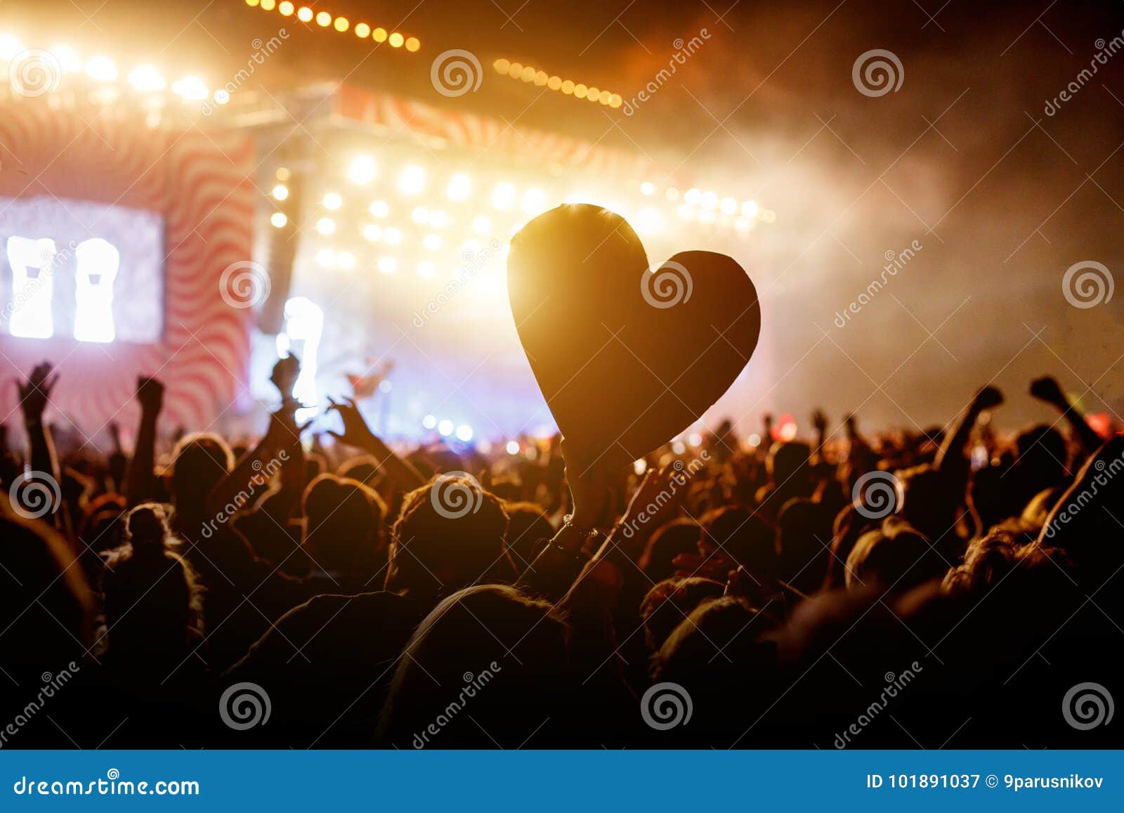 Close Up a Heart among the Crowd of People at during a Live Concert ...