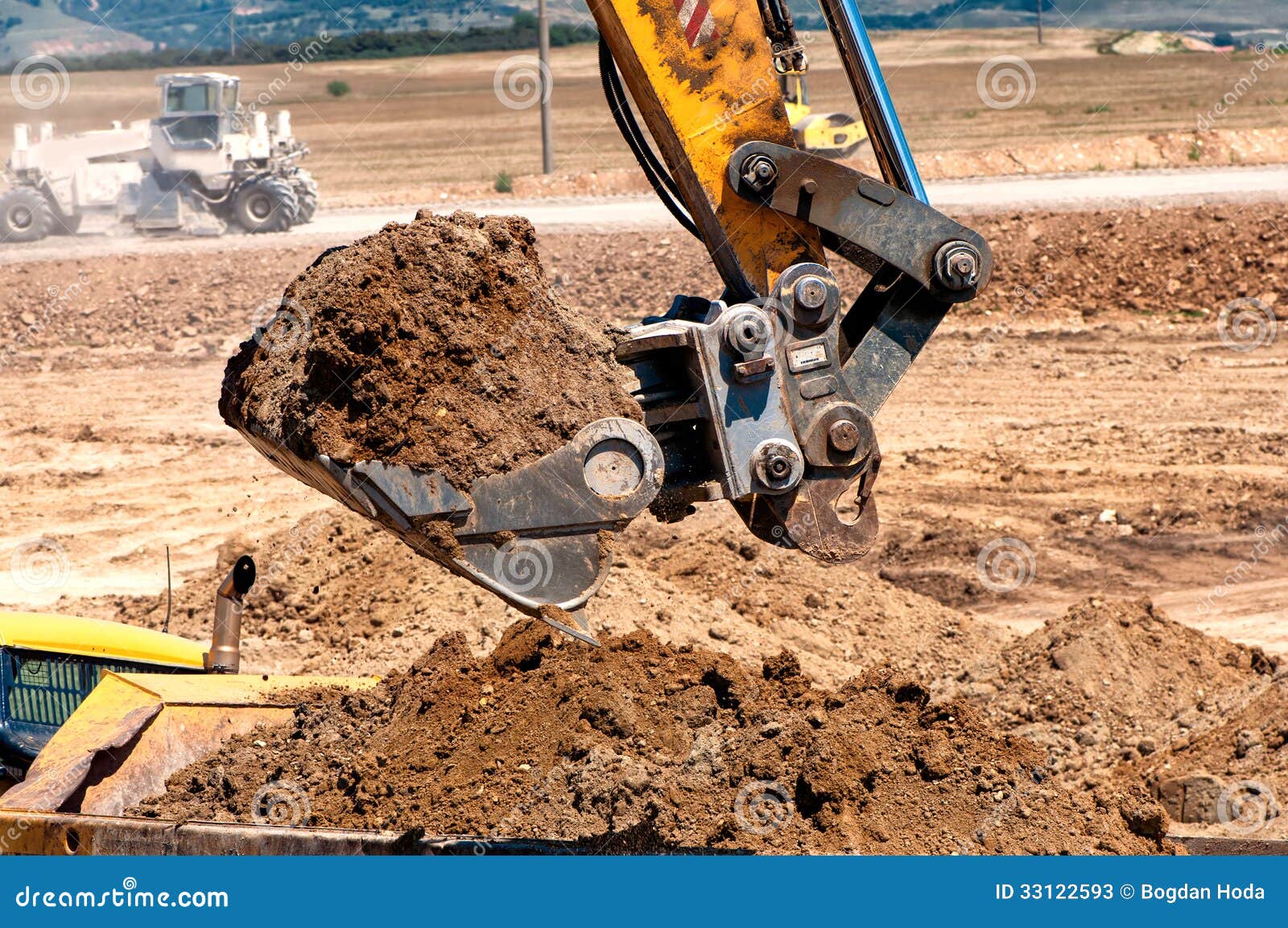 Close-up of Heavy Duty Excavator Scooping into Earth Stock Image ...