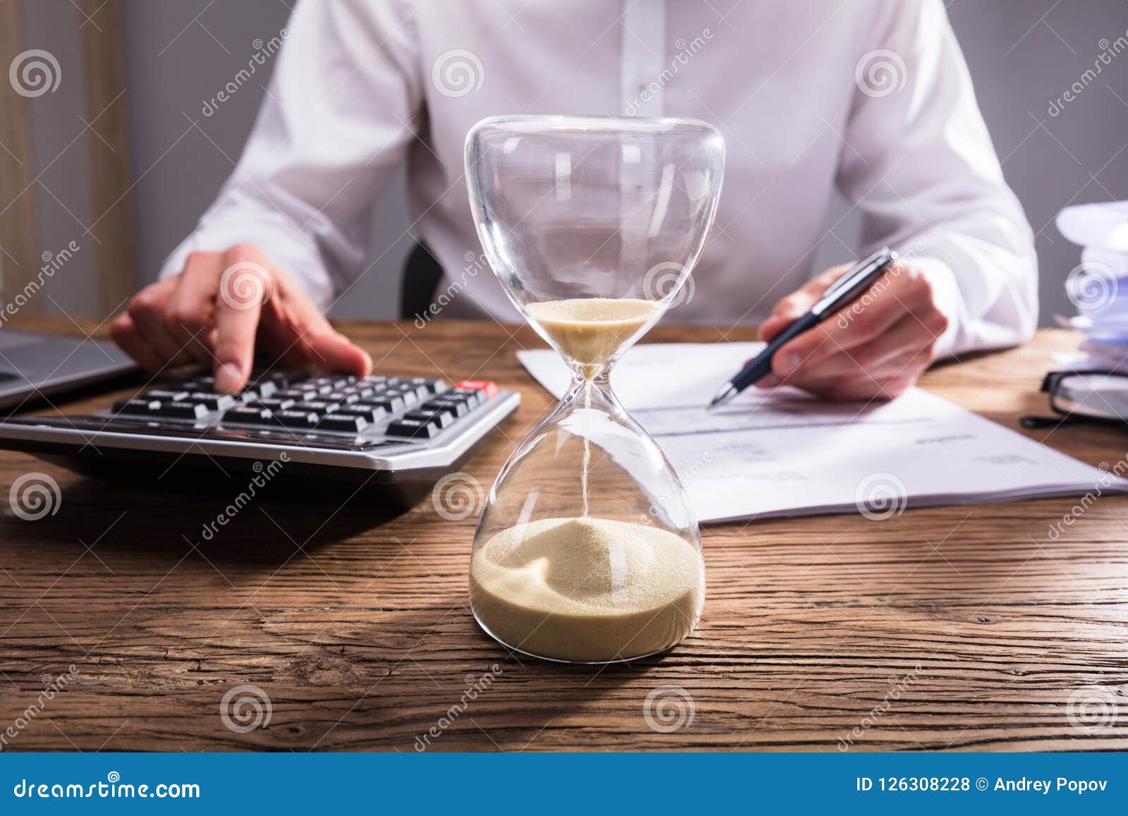 Businessperson`s Hand Calculating Invoice in Office Stock Photo - Image ... Businessperson`s Hand Calculating Invoice in Office Stock Photo - Image ...