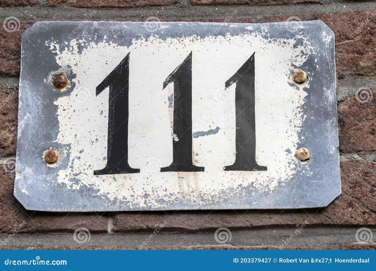 Close Up House Number 111 stock image. Image of brick - 203379427