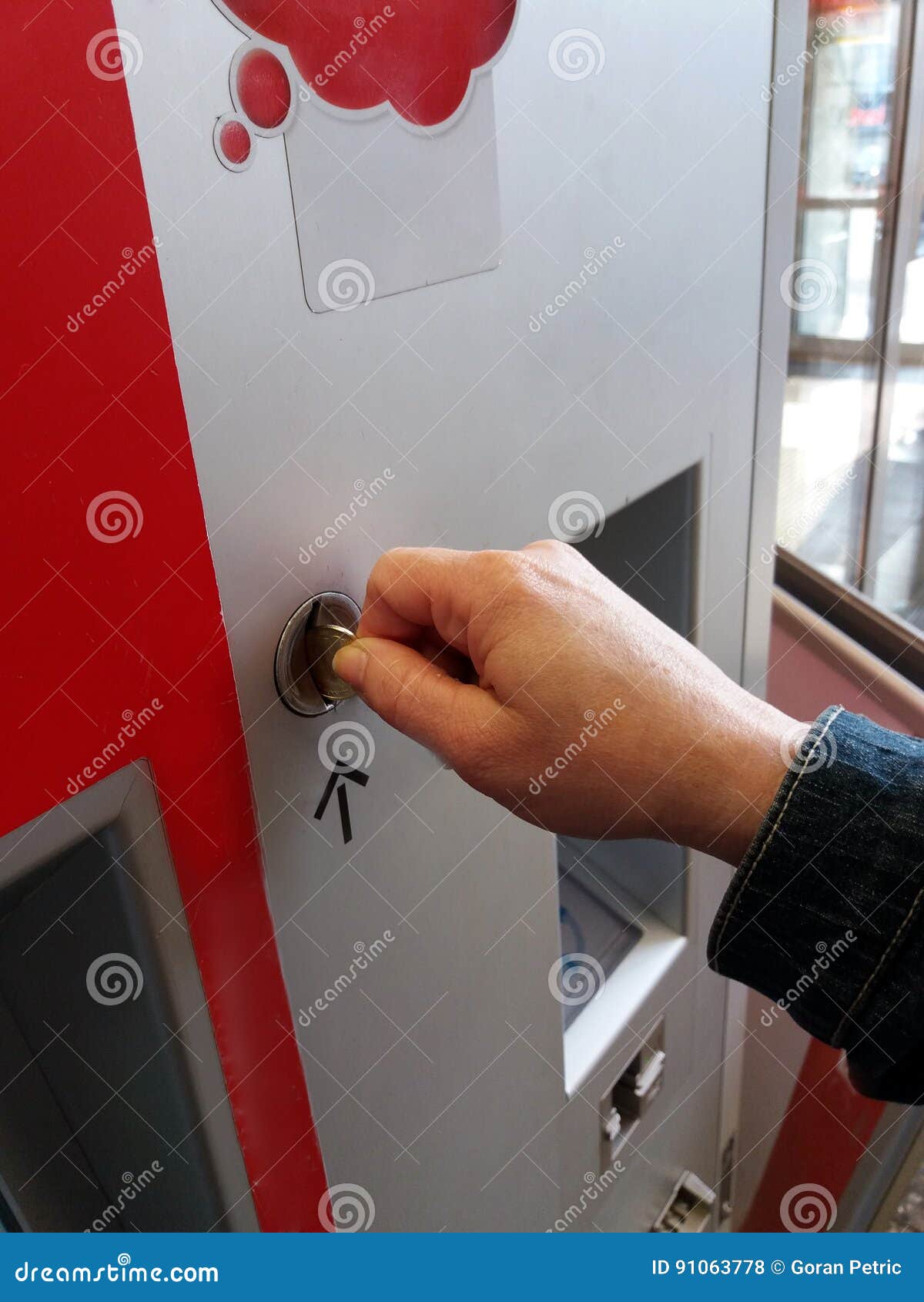 Close-up of Human Hand Inserting Coin in Vending Machine Stock Photo ...