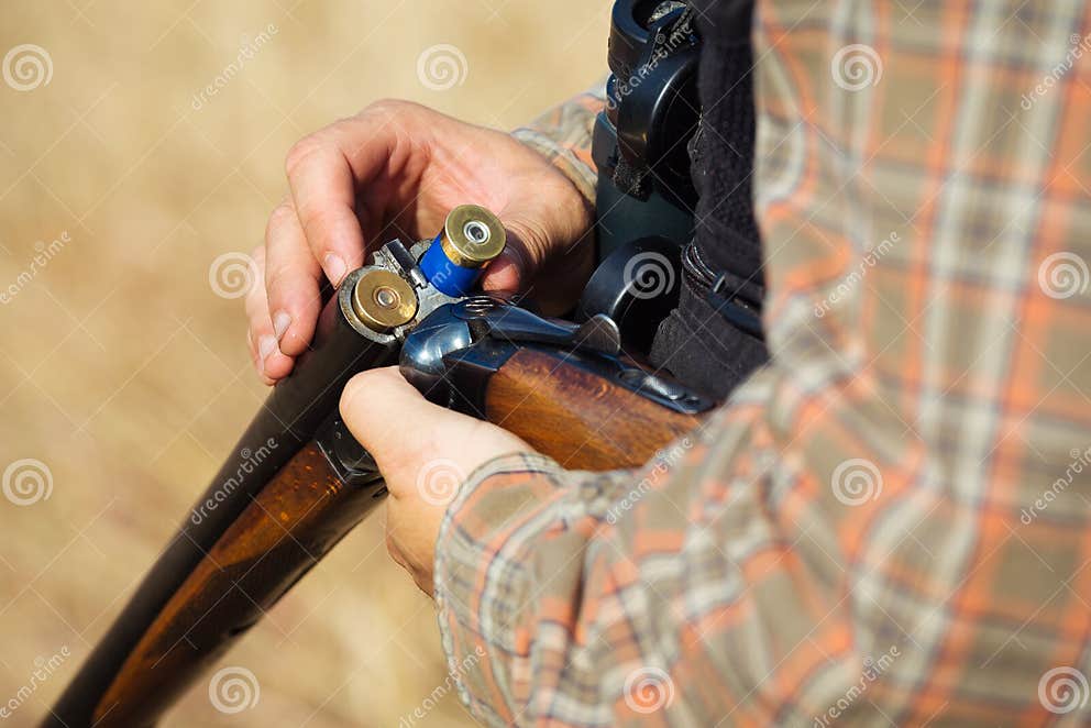 Close-up of a Hunter Loading His Shotgun Stock Photo - Image of ...