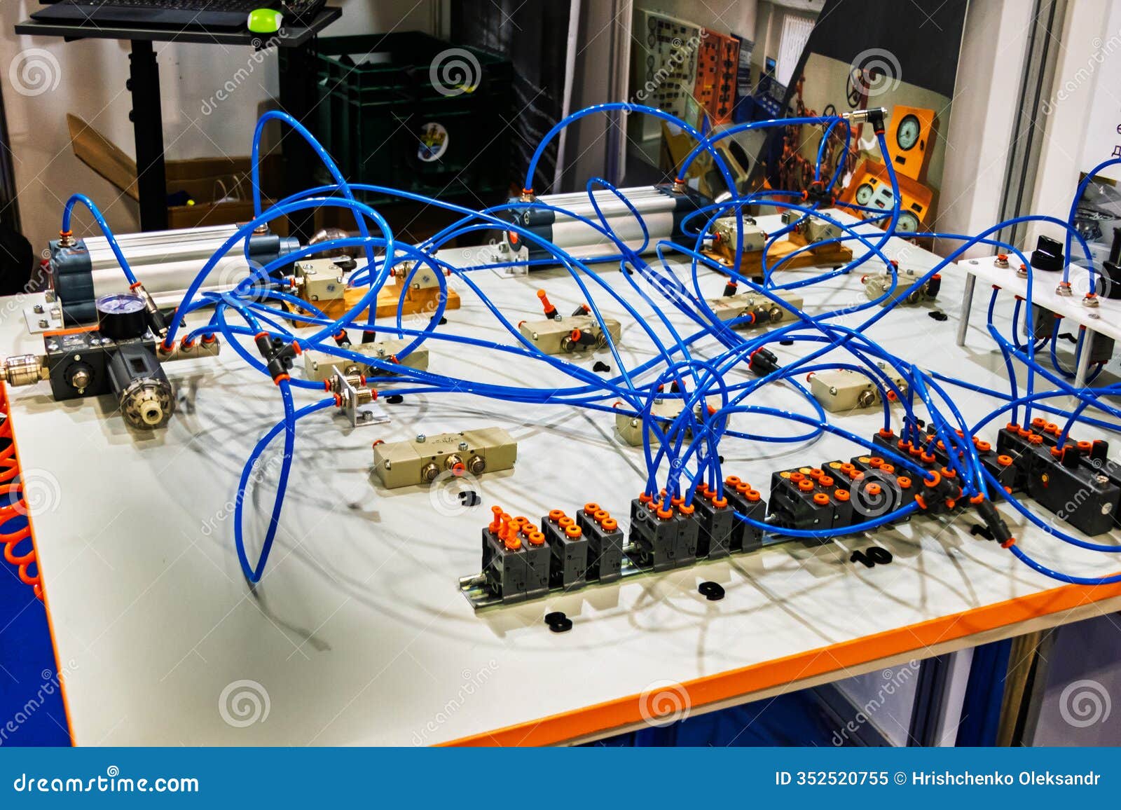 A Close-up of a Hydraulic Training Rig with Numerous Blue Hoses and ...
