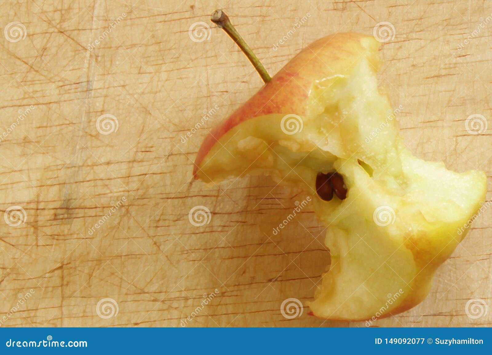 Close Up Bitten Apple Core on a Wooden Board Stock Image - Image of ...