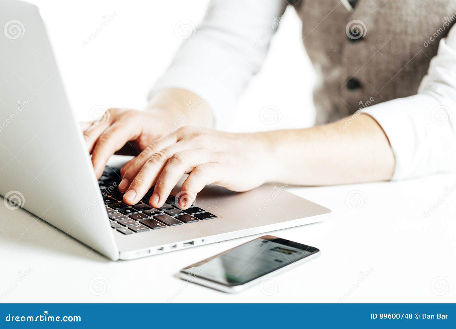 Close Up Image of Businessman Using a Laptop and a Smartphone Stock ...