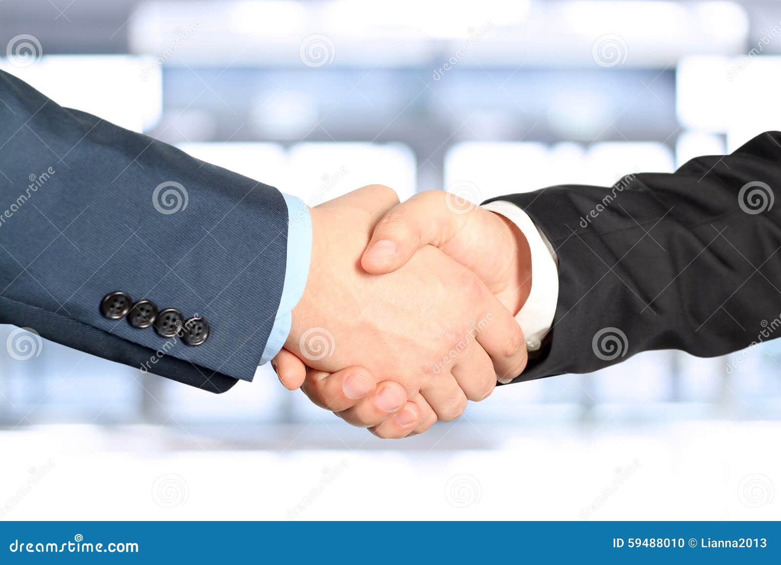 Close-up Image of a Firm Handshake between Two Colleagues Stock Photo ...