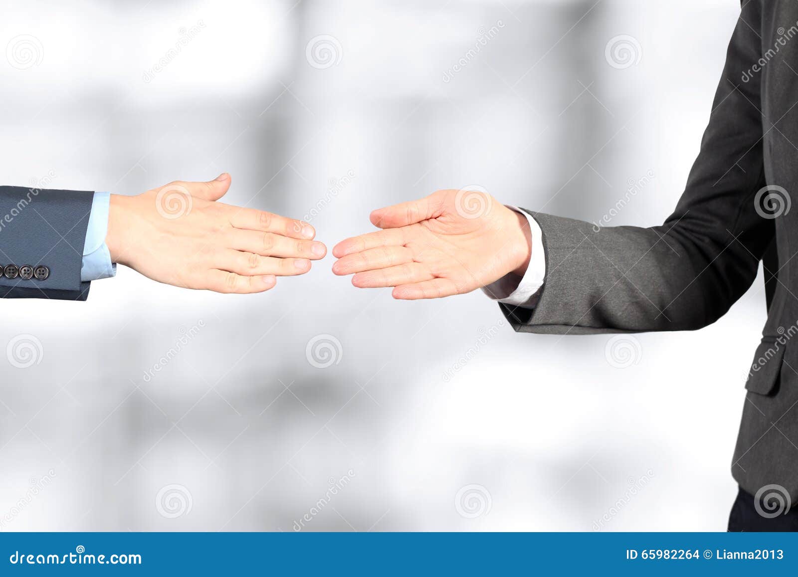Close-up Image of a Firm Handshake between Two Colleagues Stock Photo ...