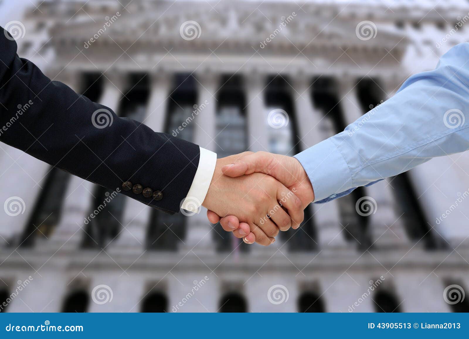 Close-up Image of a Firm Handshake between Two Colleagues in of Stock ...