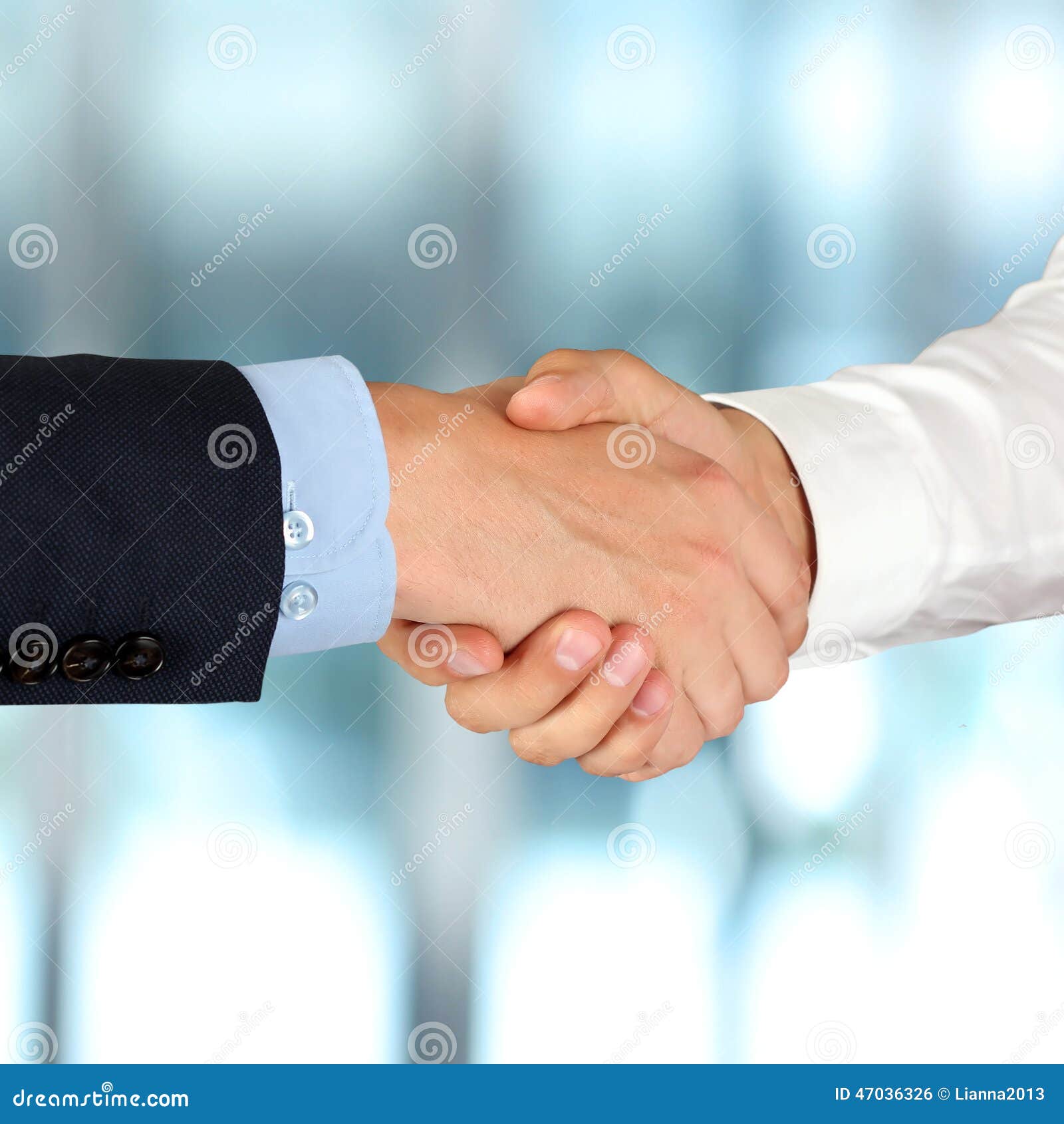 Close-up Image of a Firm Handshake between Two Colleagues in of Stock ...