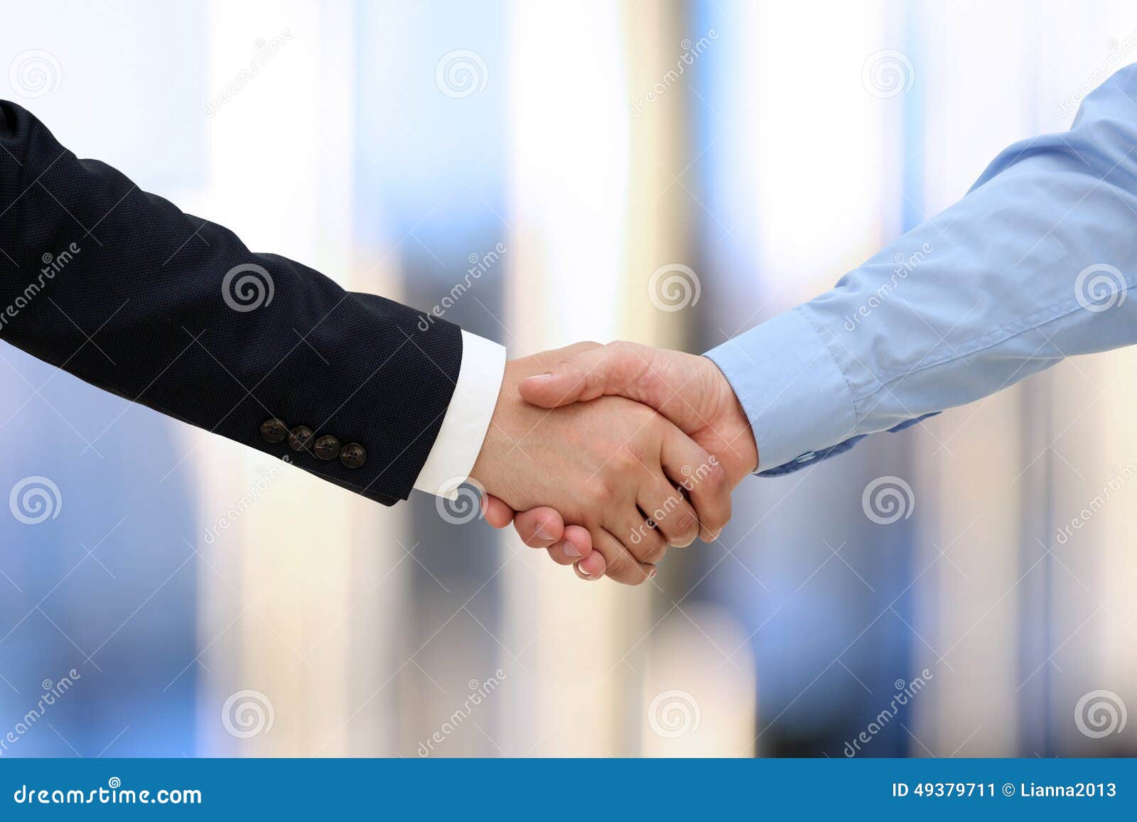 Close-up Image of a Firm Handshake between Two Colleagues in of Stock ...
