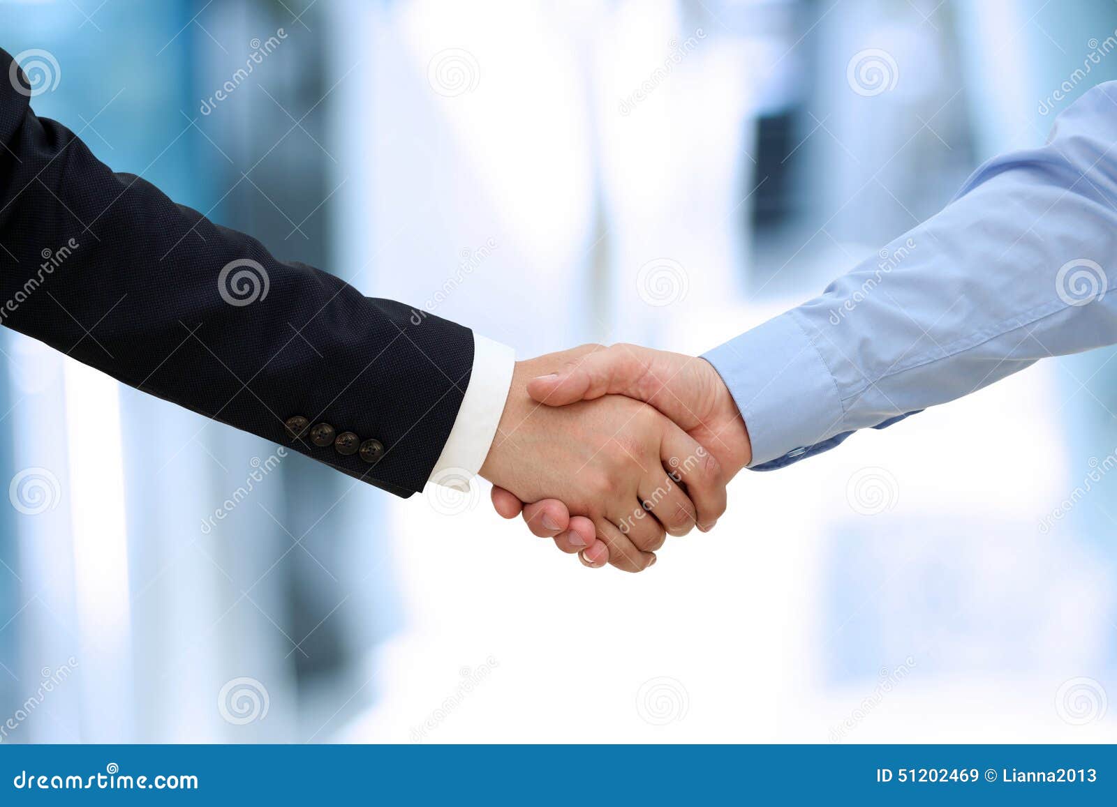 Close-up Image of a Firm Handshake between Two Colleagues in of Stock ...