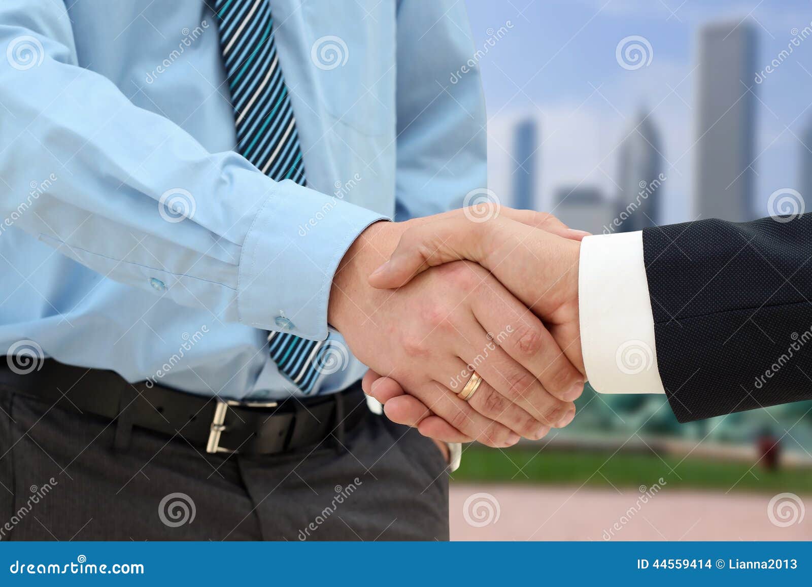 Close-up Image of a Firm Handshake between Two Colleagues Outsi Stock ...