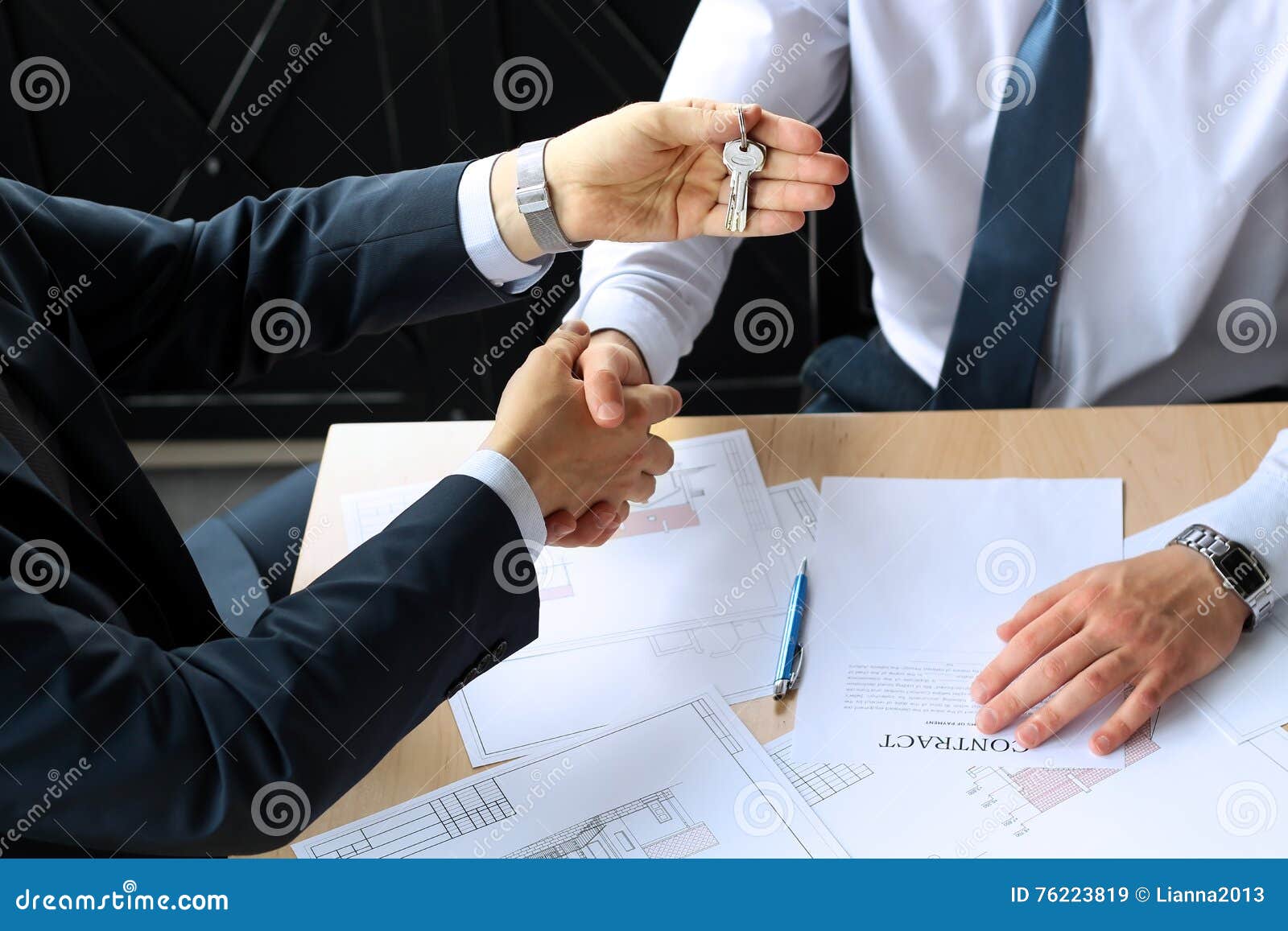 Close-up Image of a Firm Handshake between Two Colleagues after Signing ...