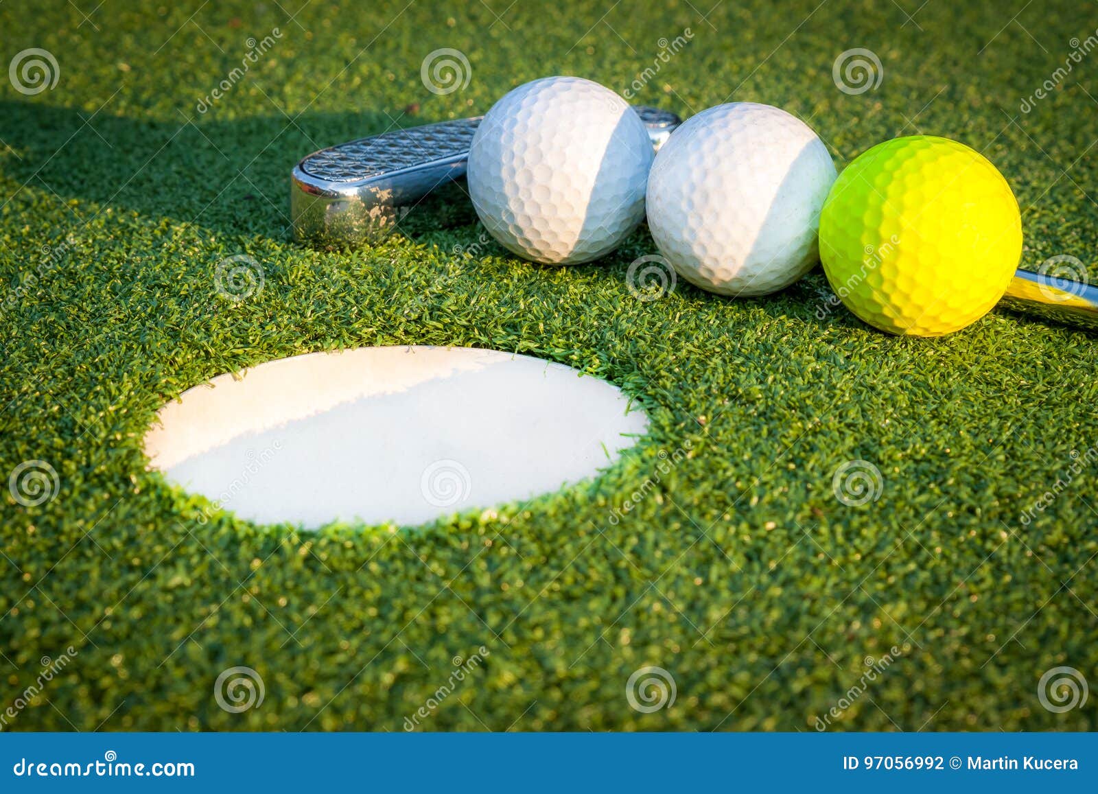 Close Up Image of Golf Hole with Balls and Putt Stock Photo - Image of ...