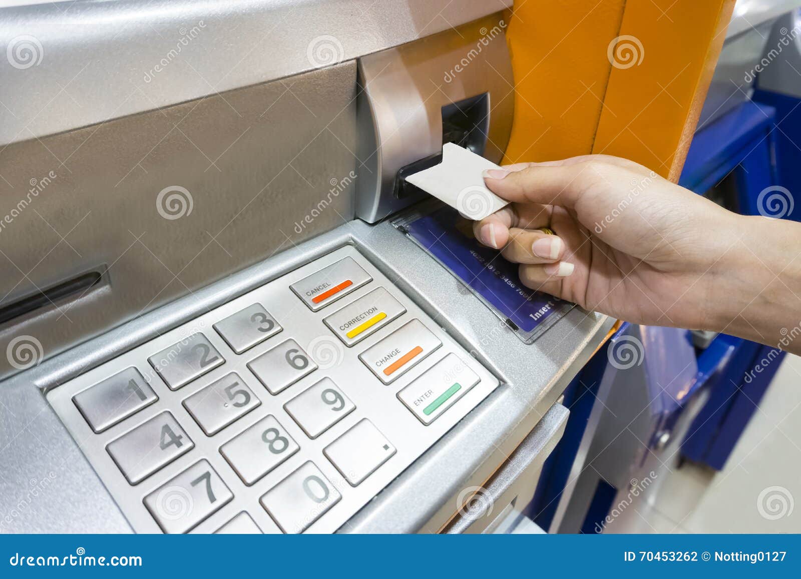 Close Up Image of a Human Hand Inserting a Credit Card in the at Stock ...
