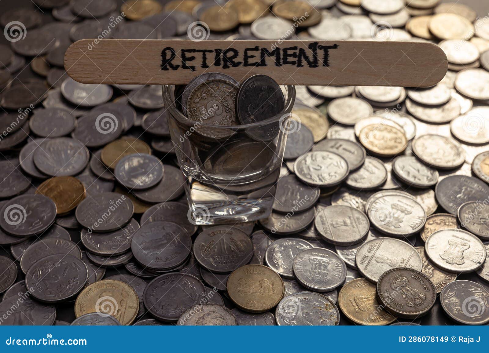Indian Rupees Coins Spread on Table with Retirement Word Stock Image ...