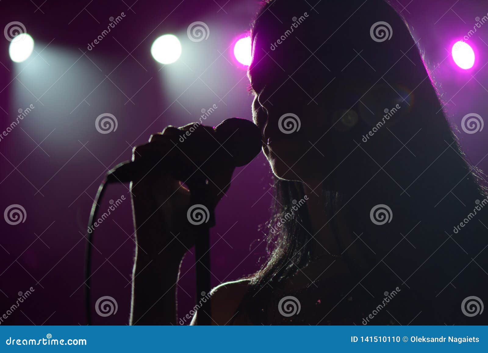 Close Up Image of Live Singer on Stage. Microphone in Hand Singer on ...