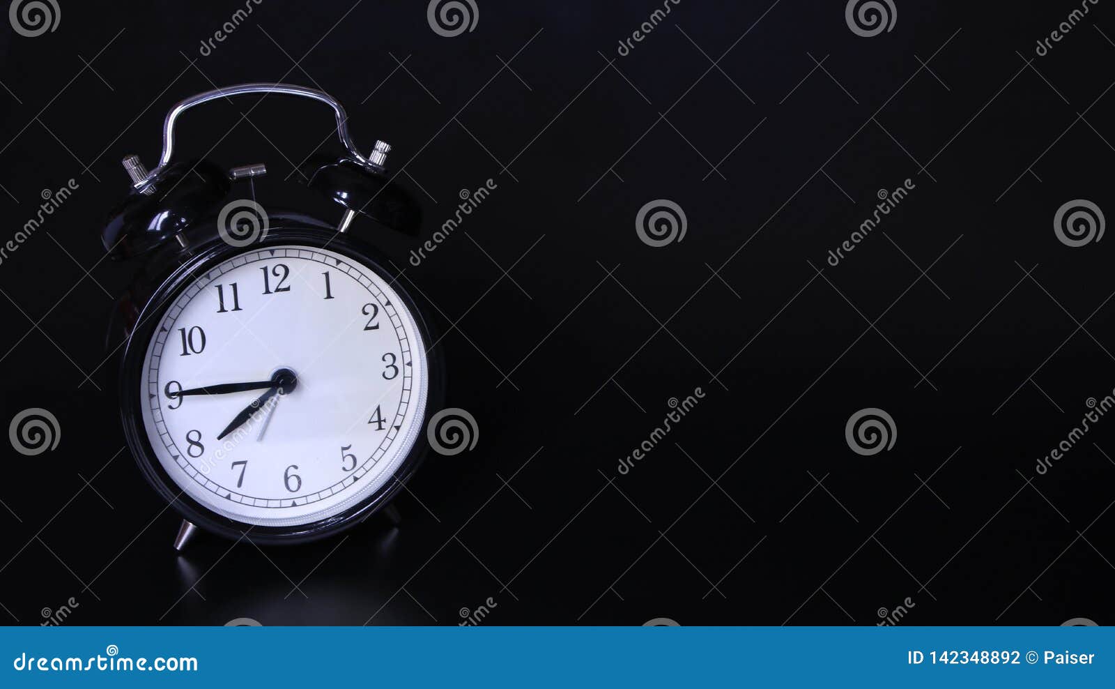 Close Up Image of Old Black Vintage Alarm Clock. Seven`clock and Forty ... Close Up Image of Old Black Vintage Alarm Clock. Seven`clock and Forty ...