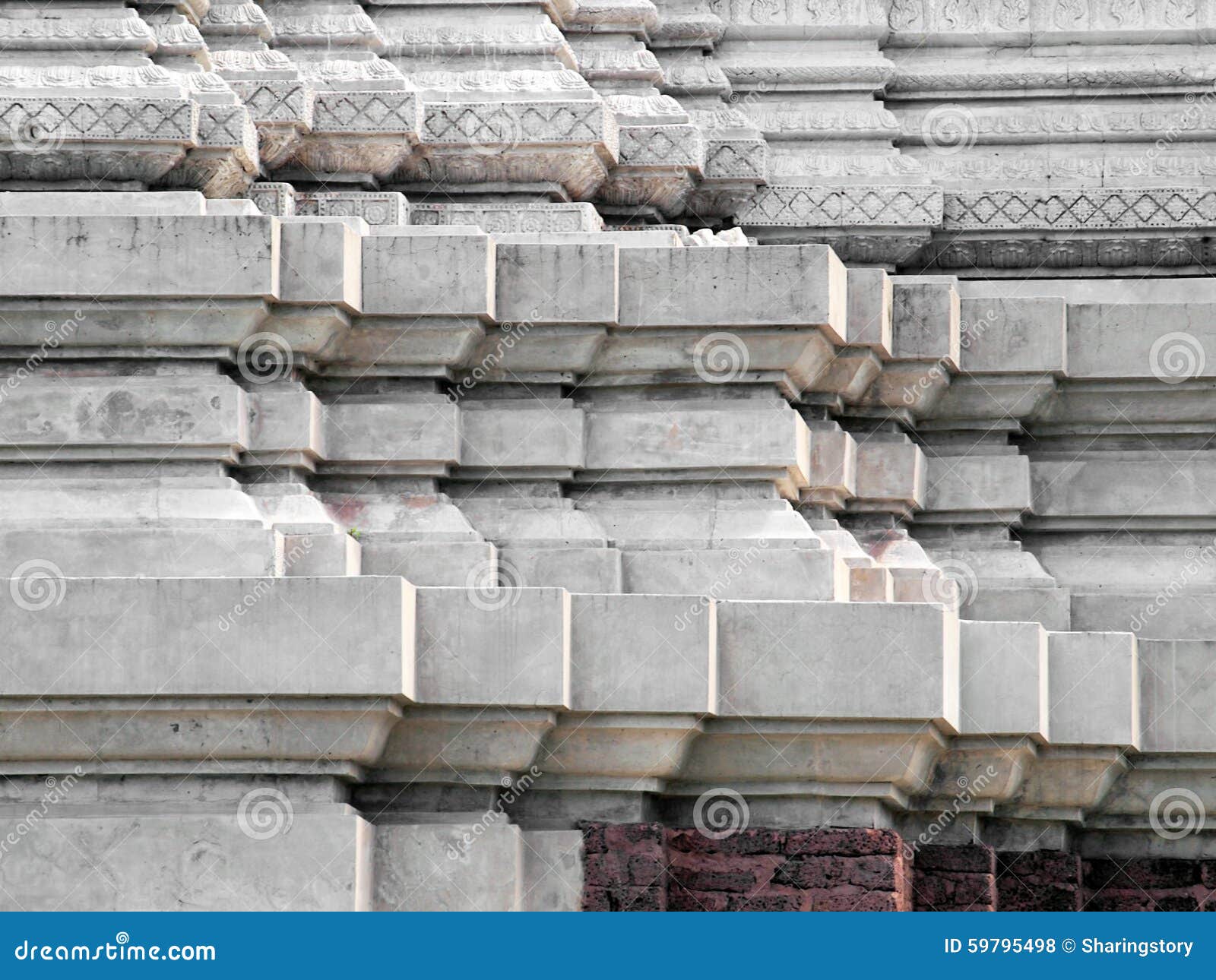 Part Of The Wall With Crumbling Plaster From Under Which A Red Brick Is ...