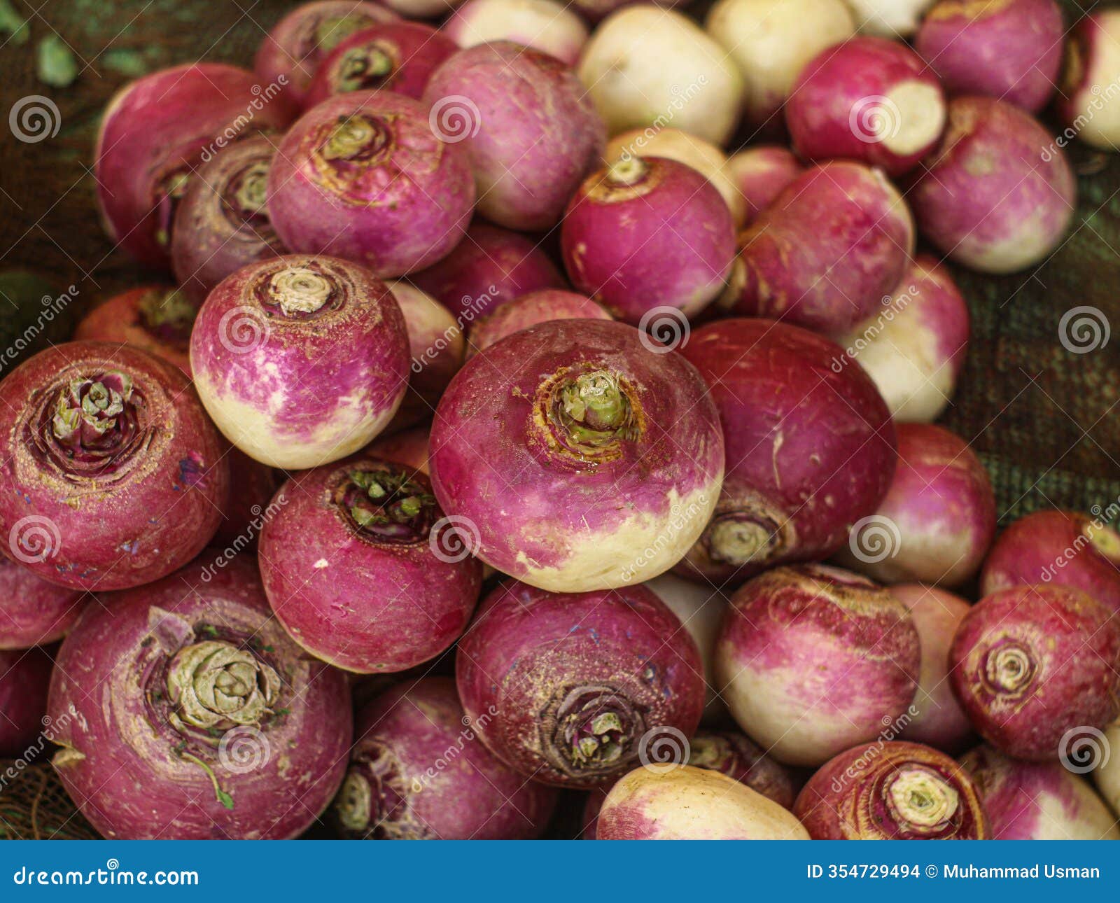 A Close-up Image Of A Pile Of Fresh, Vibrant Purple Turnips. The ...